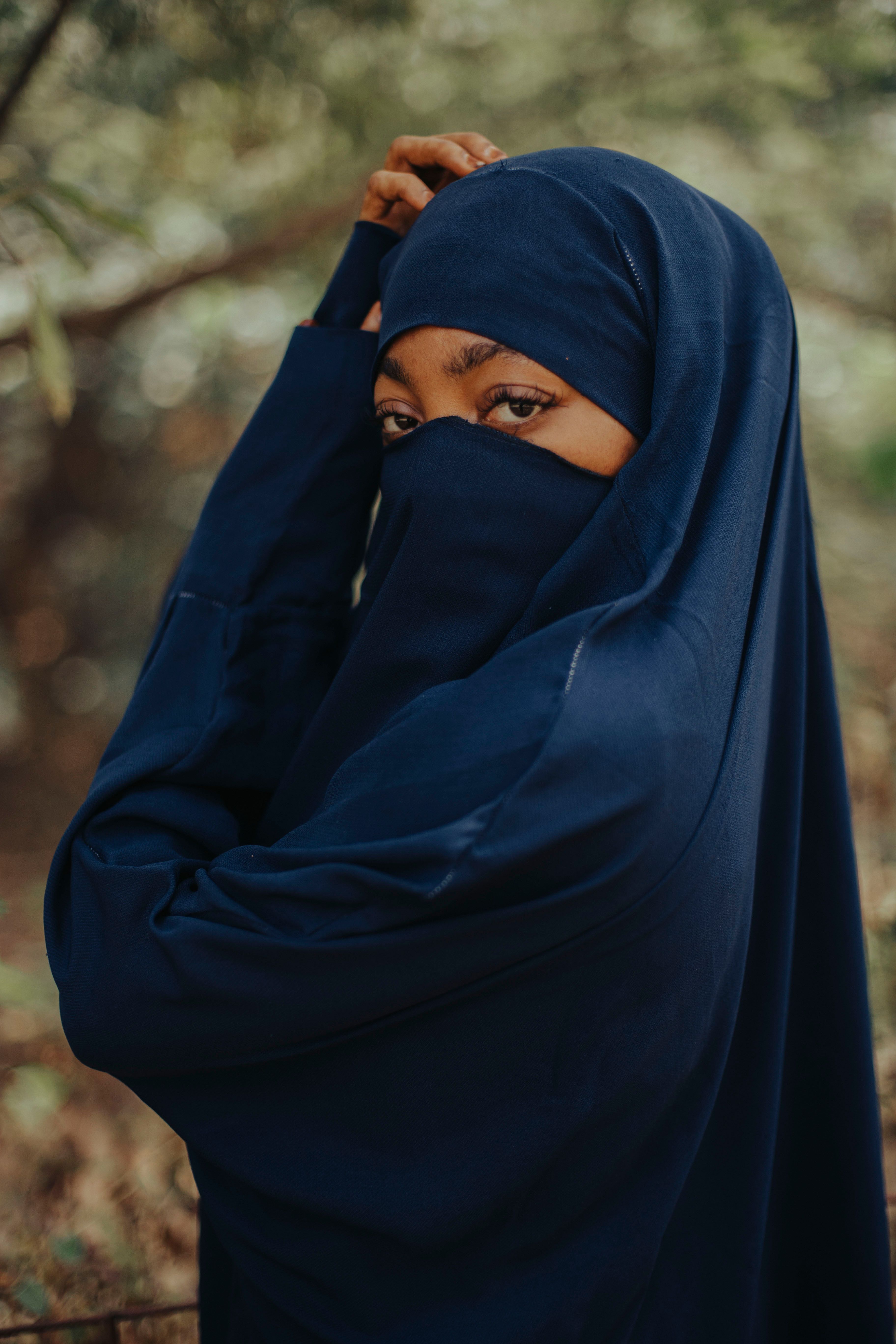 Portrait of Woman in Blue Niqab Outdoors · Free Stock Photo