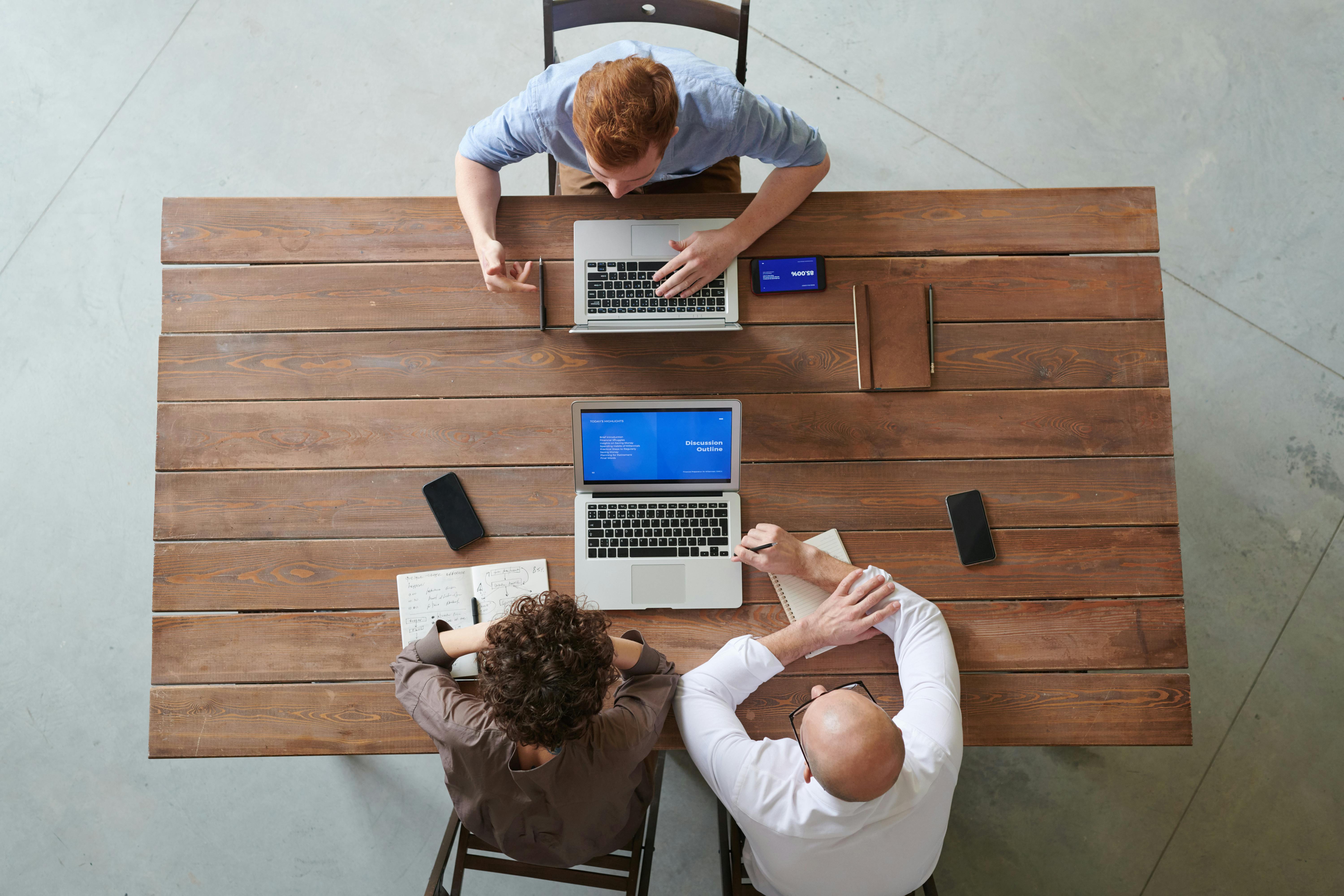 Group of People Sitting Indoors · Free Stock Photo