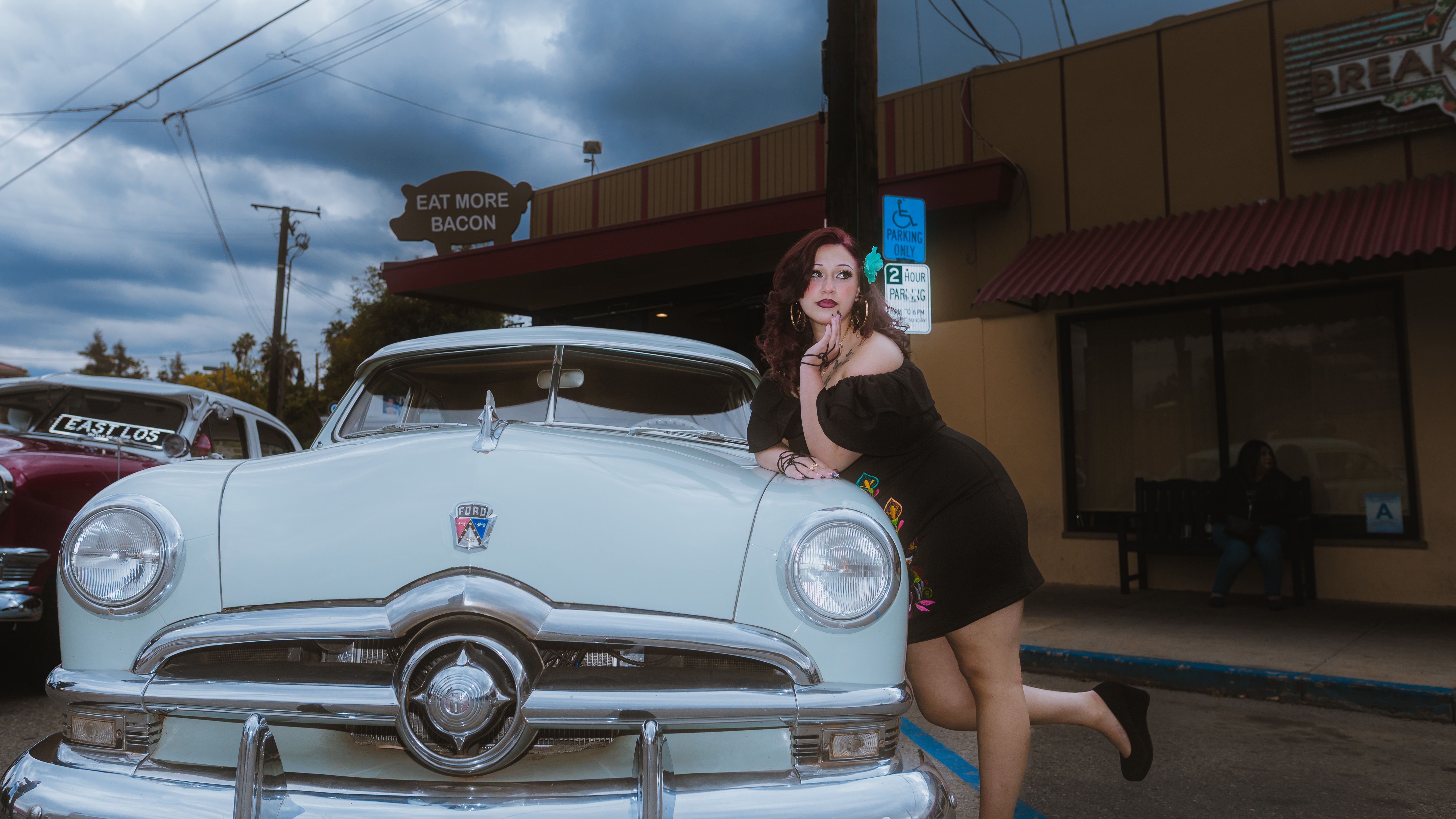 Stylish Woman Posing with Vintage Ford Car · Free Stock Photo