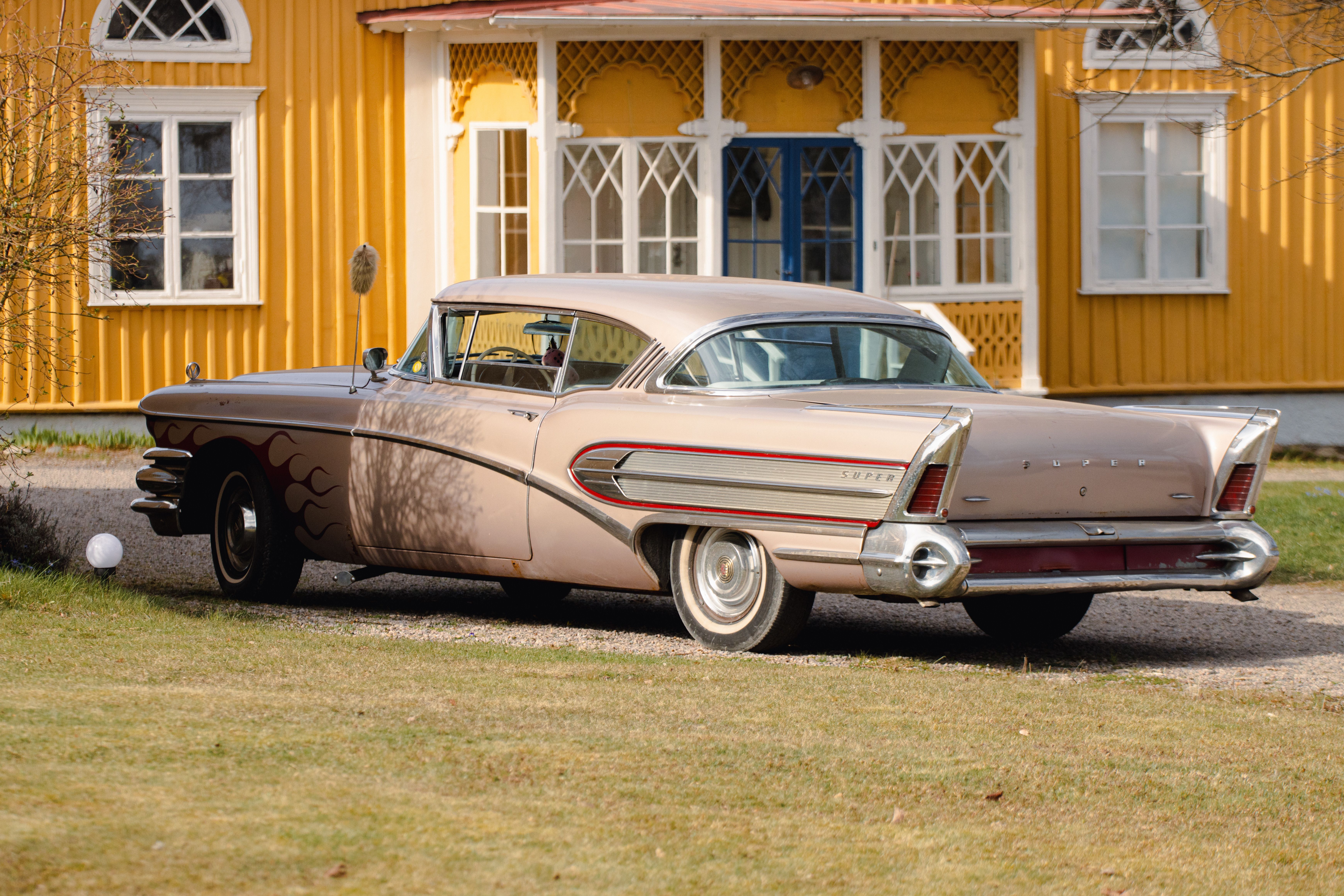 Classic Car Parked by Rustic Swedish House · Free Stock Photo