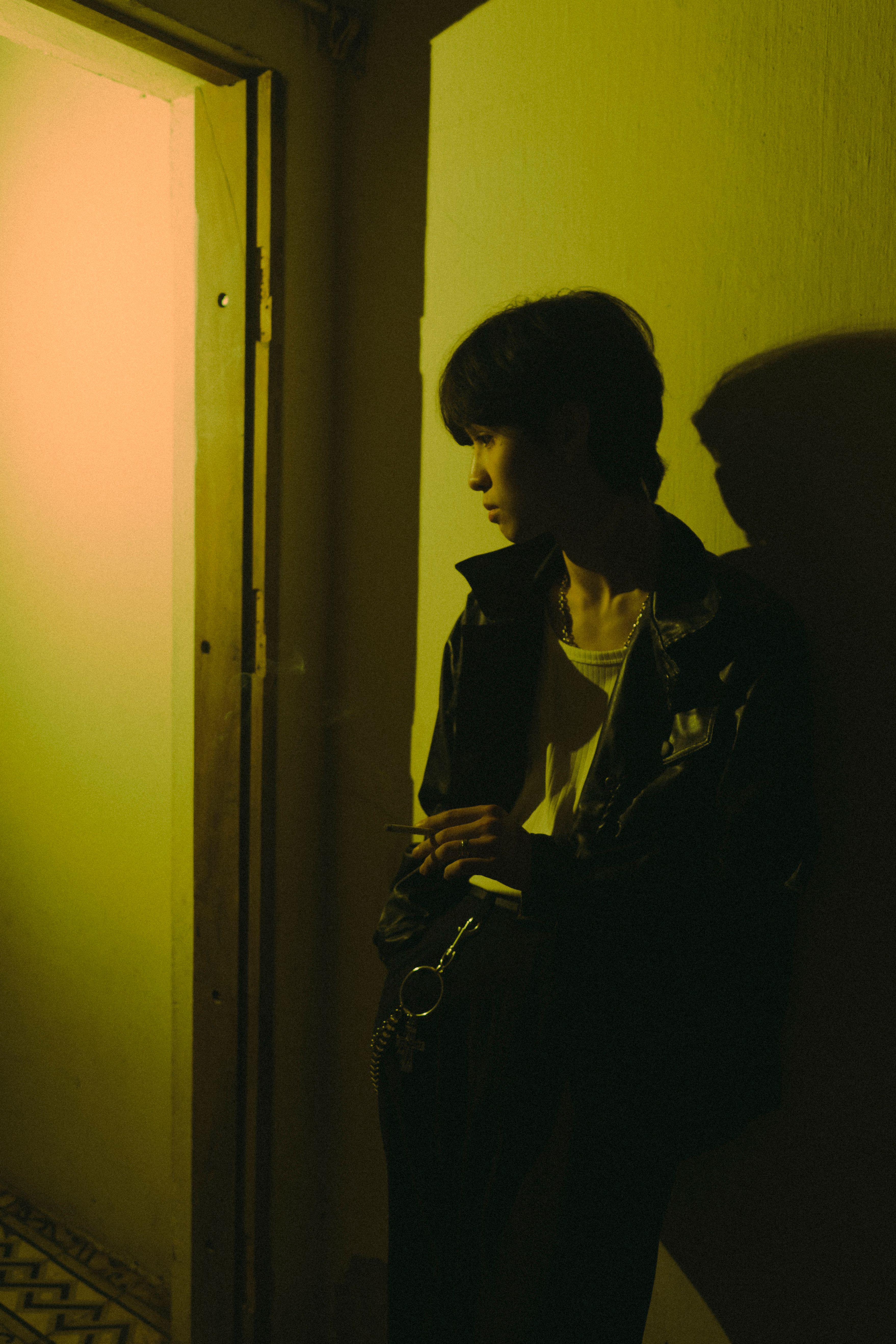 Moody Portrait of Young Adult in Dim Light · Free Stock Photo