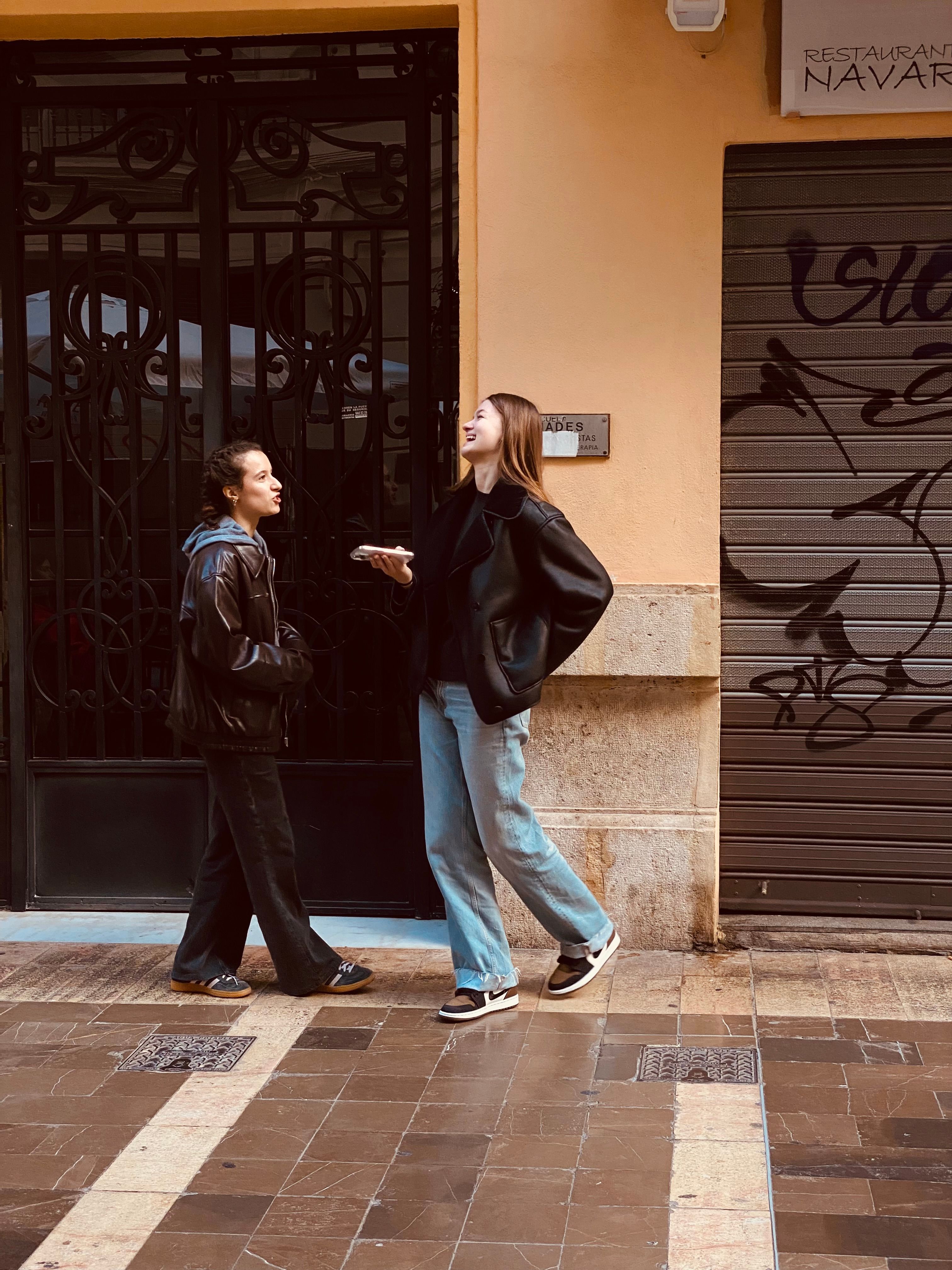 Casual Conversation on Urban Street · Free Stock Photo