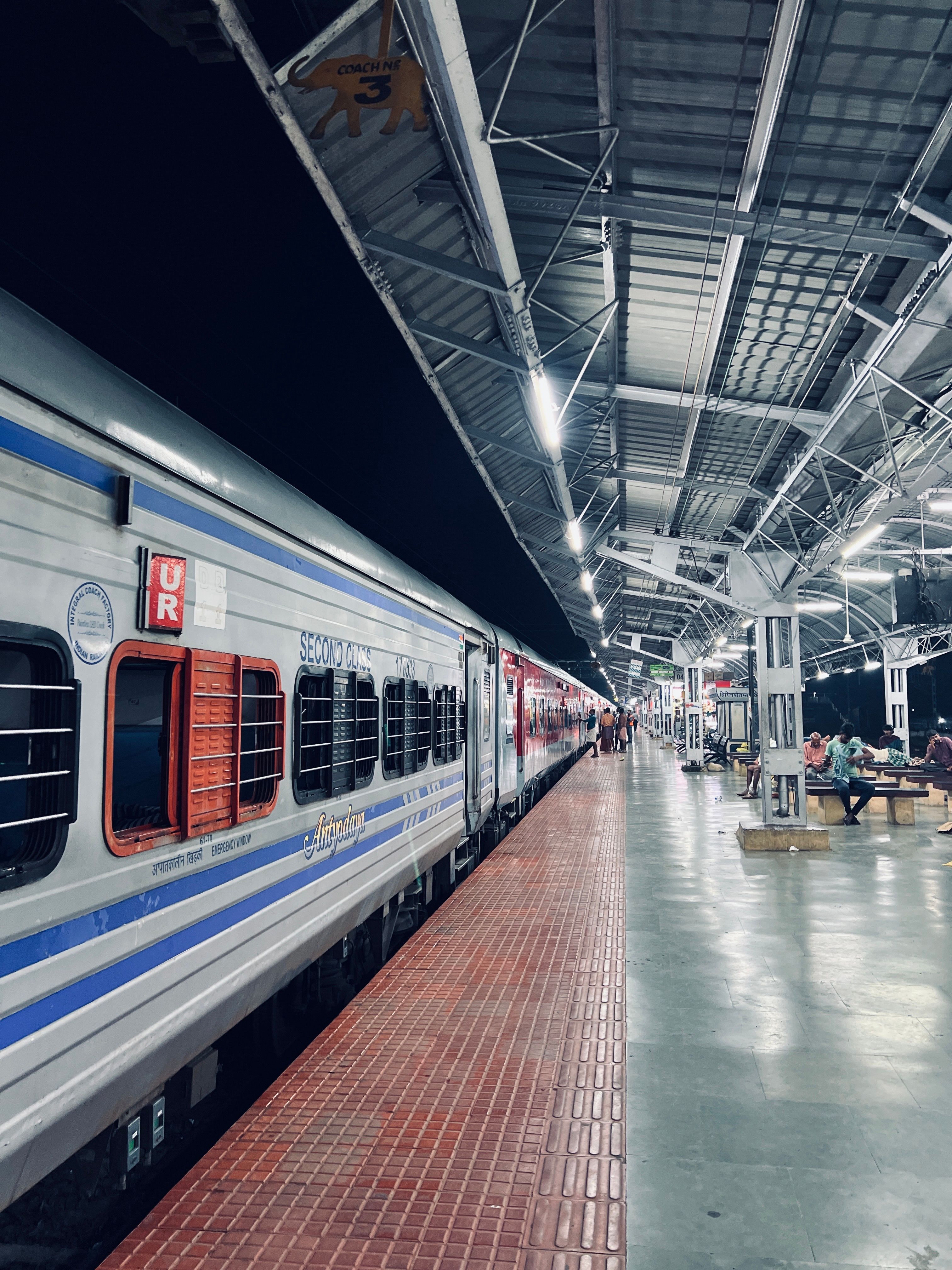 Night Train at Illuminated Railway Station · Free Stock Photo