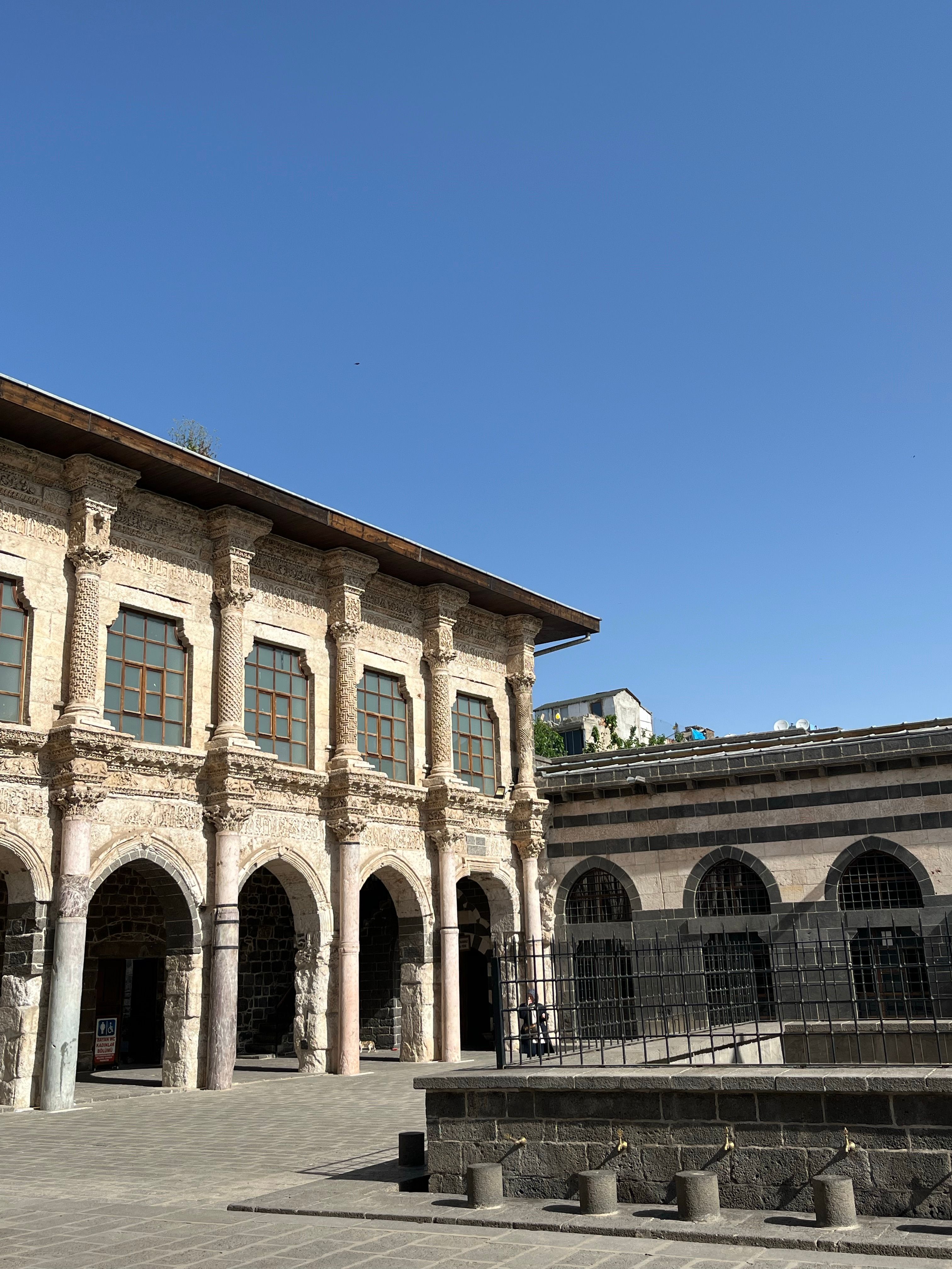 Historical Stone Building with Arched Columns · Free Stock Photo