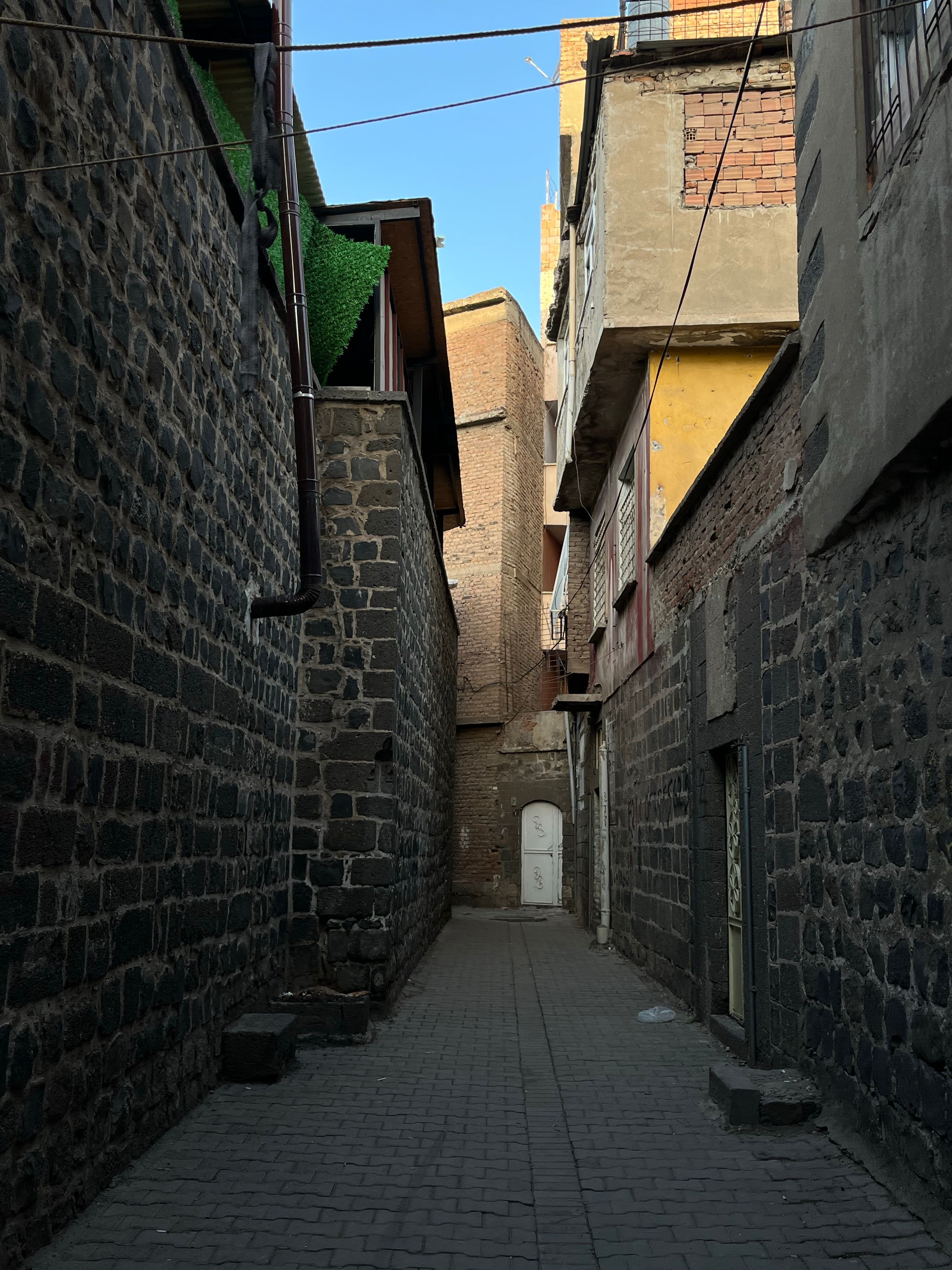 People Walking in Narrow Alley · Free Stock Photo