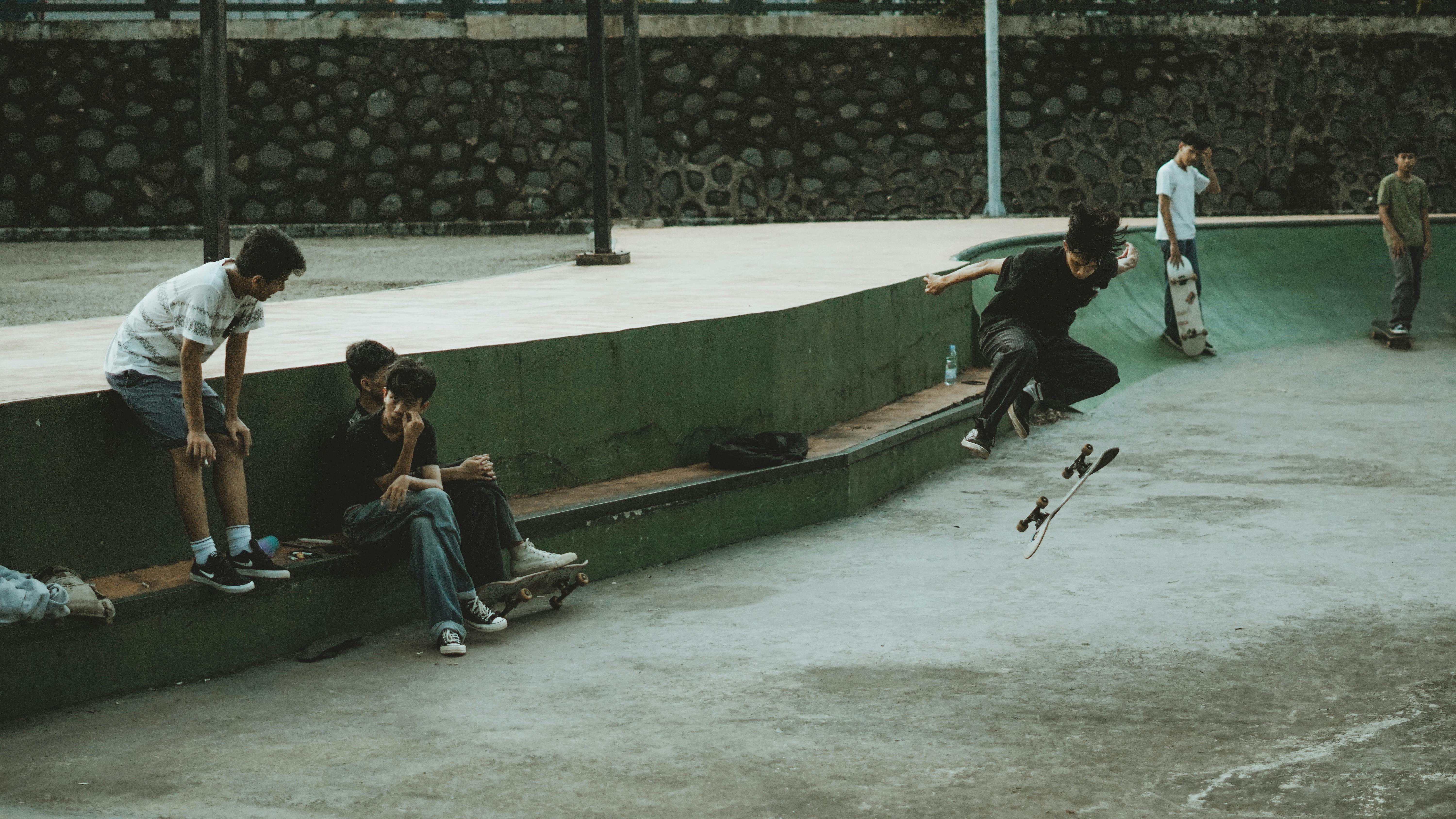 Energetic Skateboarding Tricks in West Java Park · Free Stock Photo
