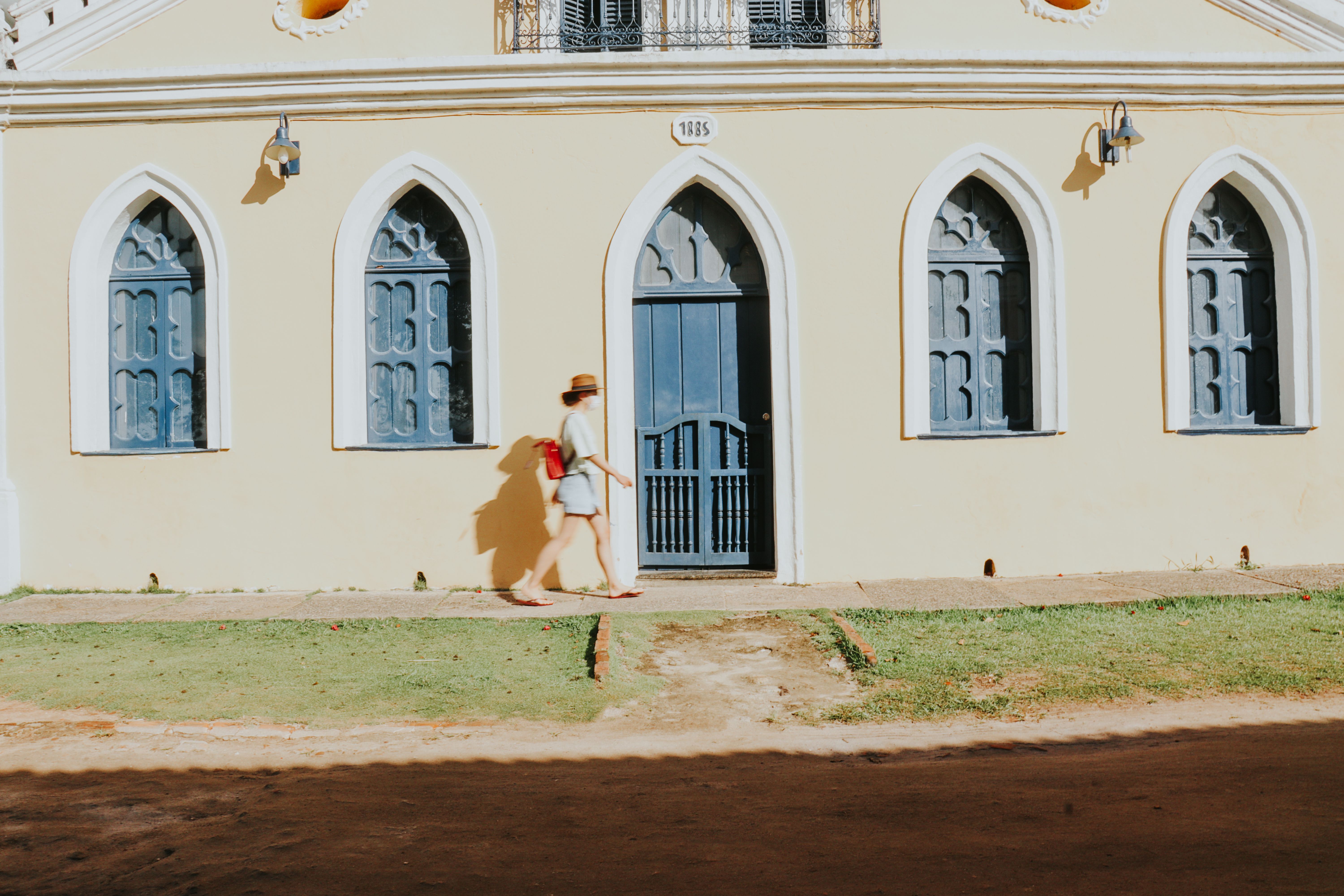 Walking by Historic Building in Porto Seguro · Free Stock Photo