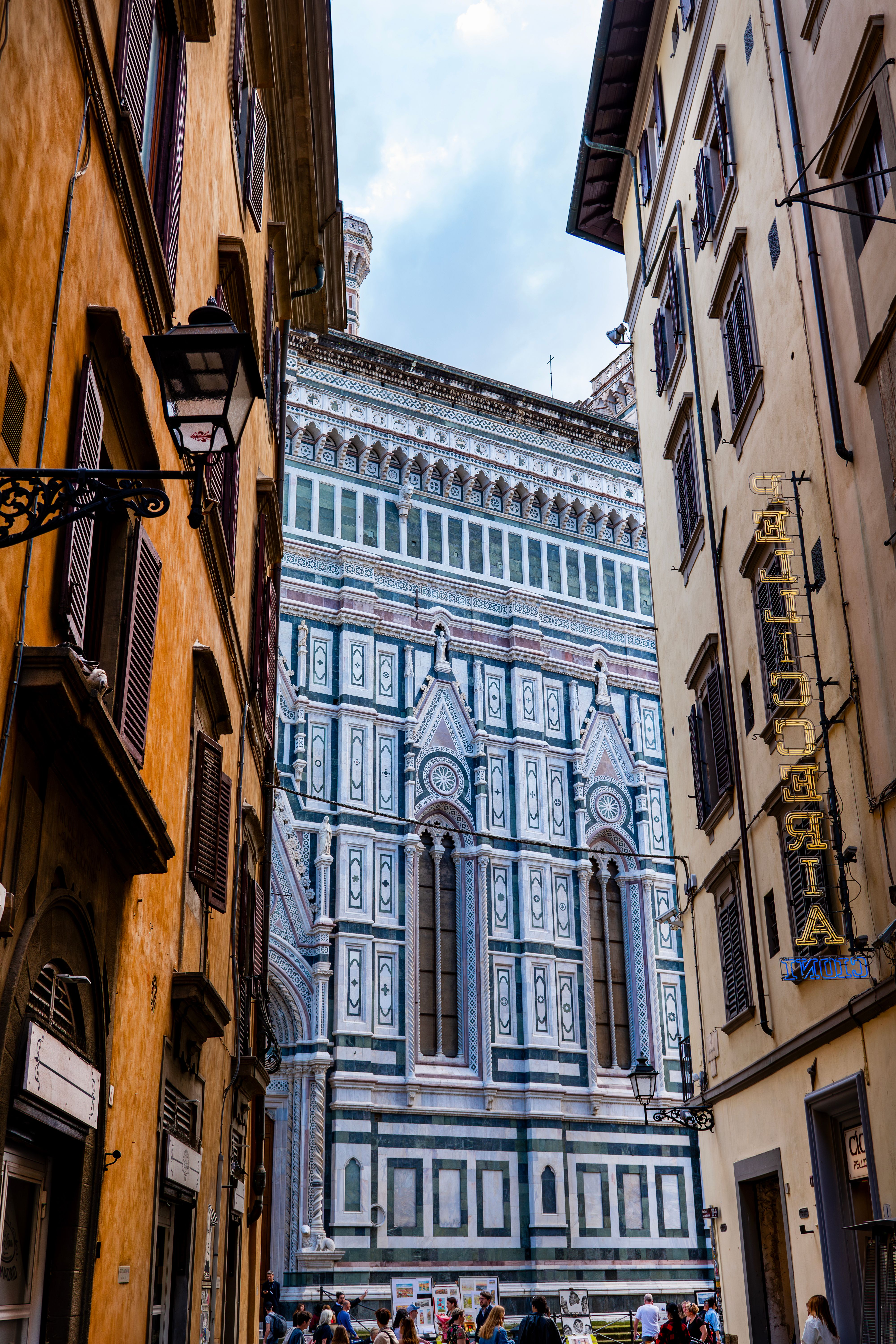 Stunning View of Florence Cathedral from a Narrow Street · Free Stock Photo