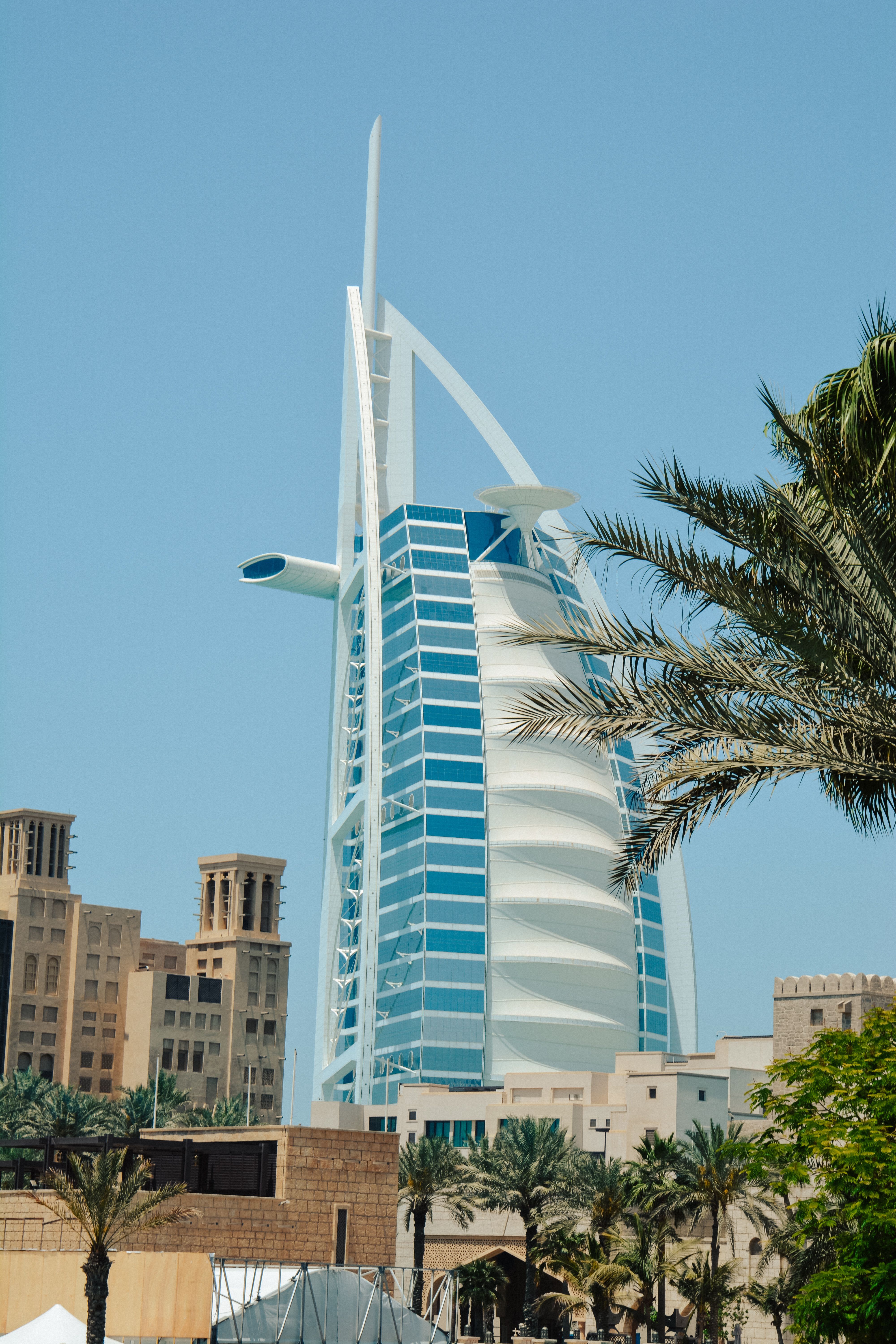 Iconic Burj Al Arab with Palm Trees in Dubai · Free Stock Photo