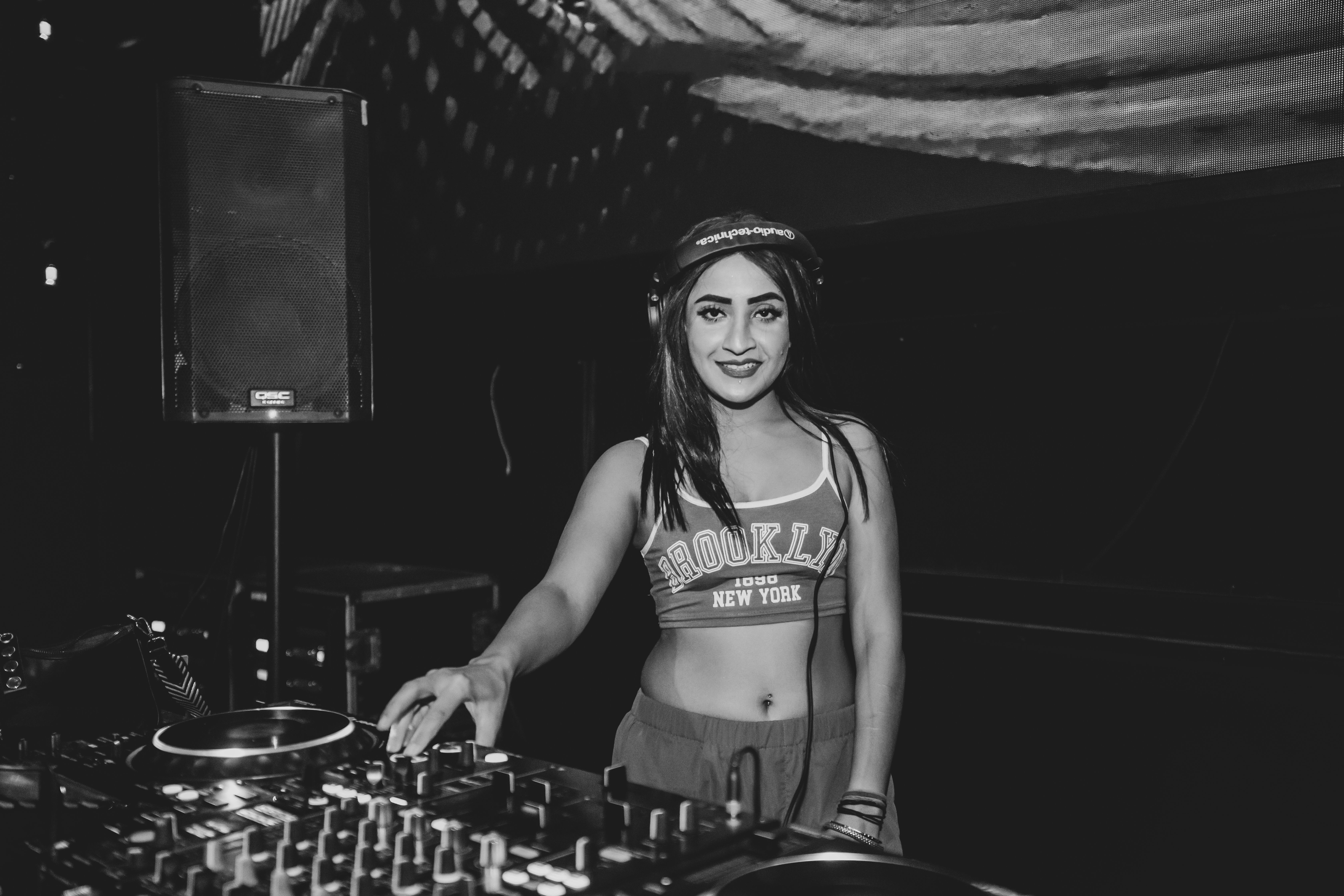Nightlife DJ in Black and White Ambiance · Free Stock Photo