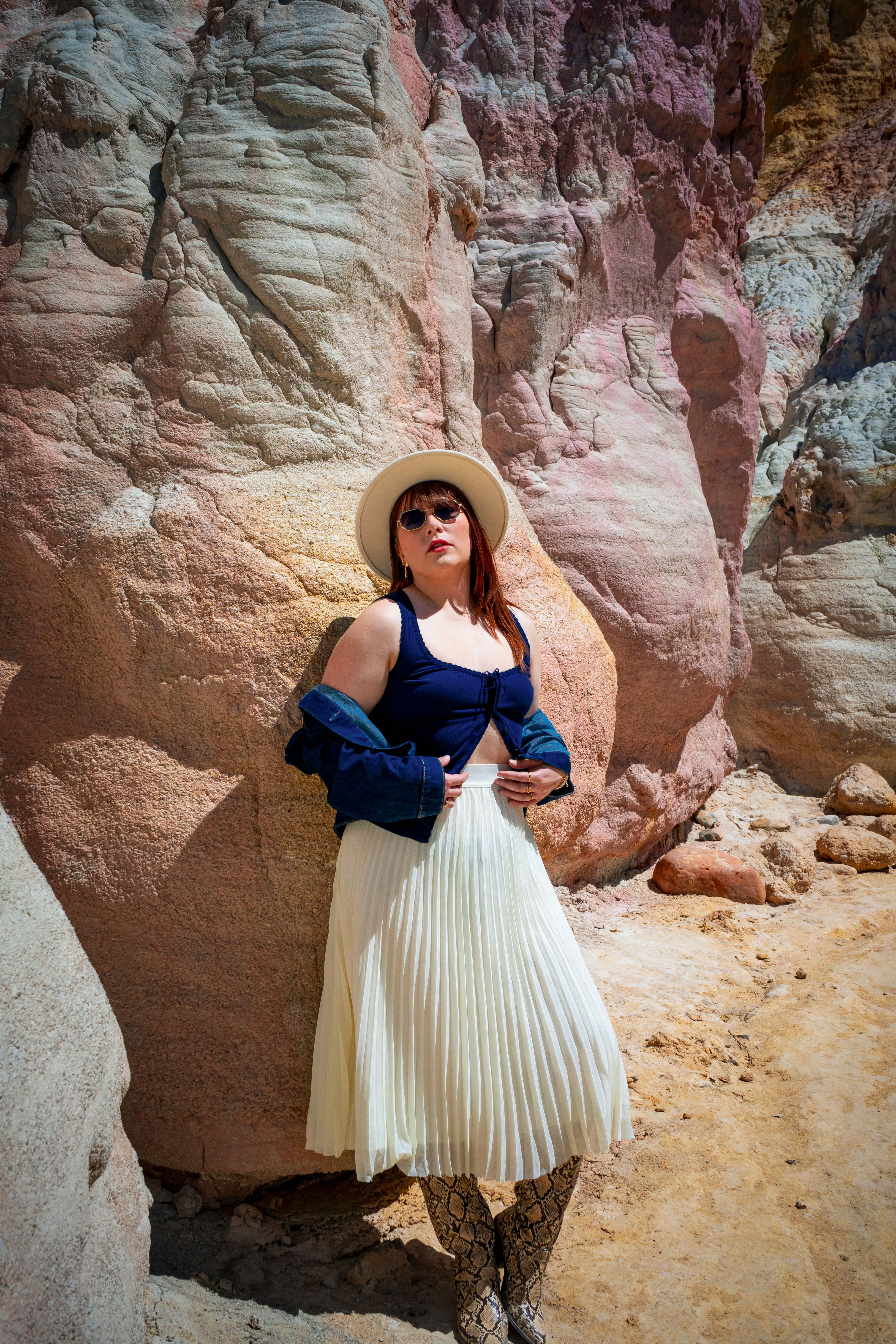 Fashionable Woman Posing Among Red Rocks in Calhan · Free Stock Photo