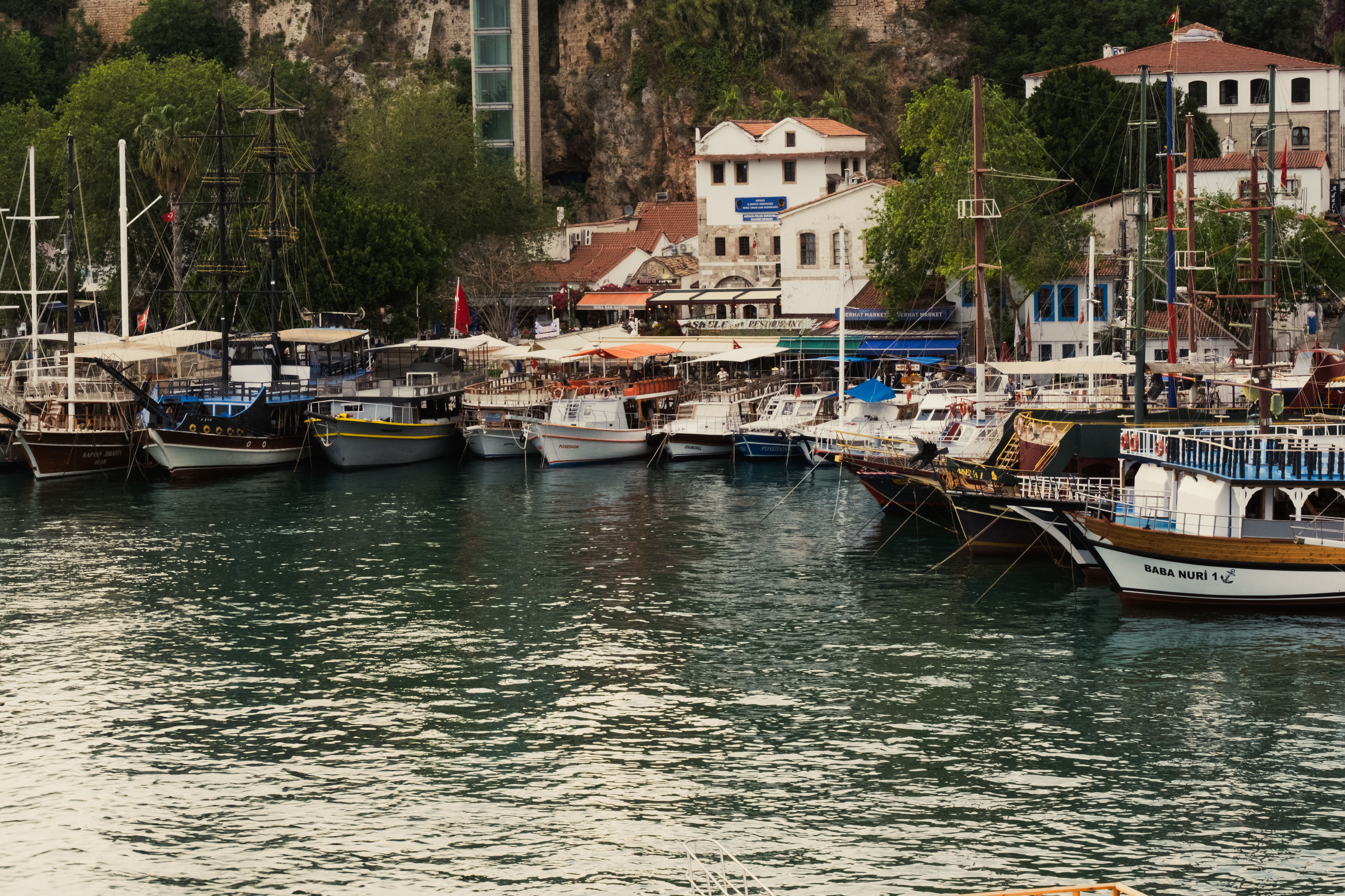 Picturesque Harbor Scene with Docked Boats · Free Stock Photo
