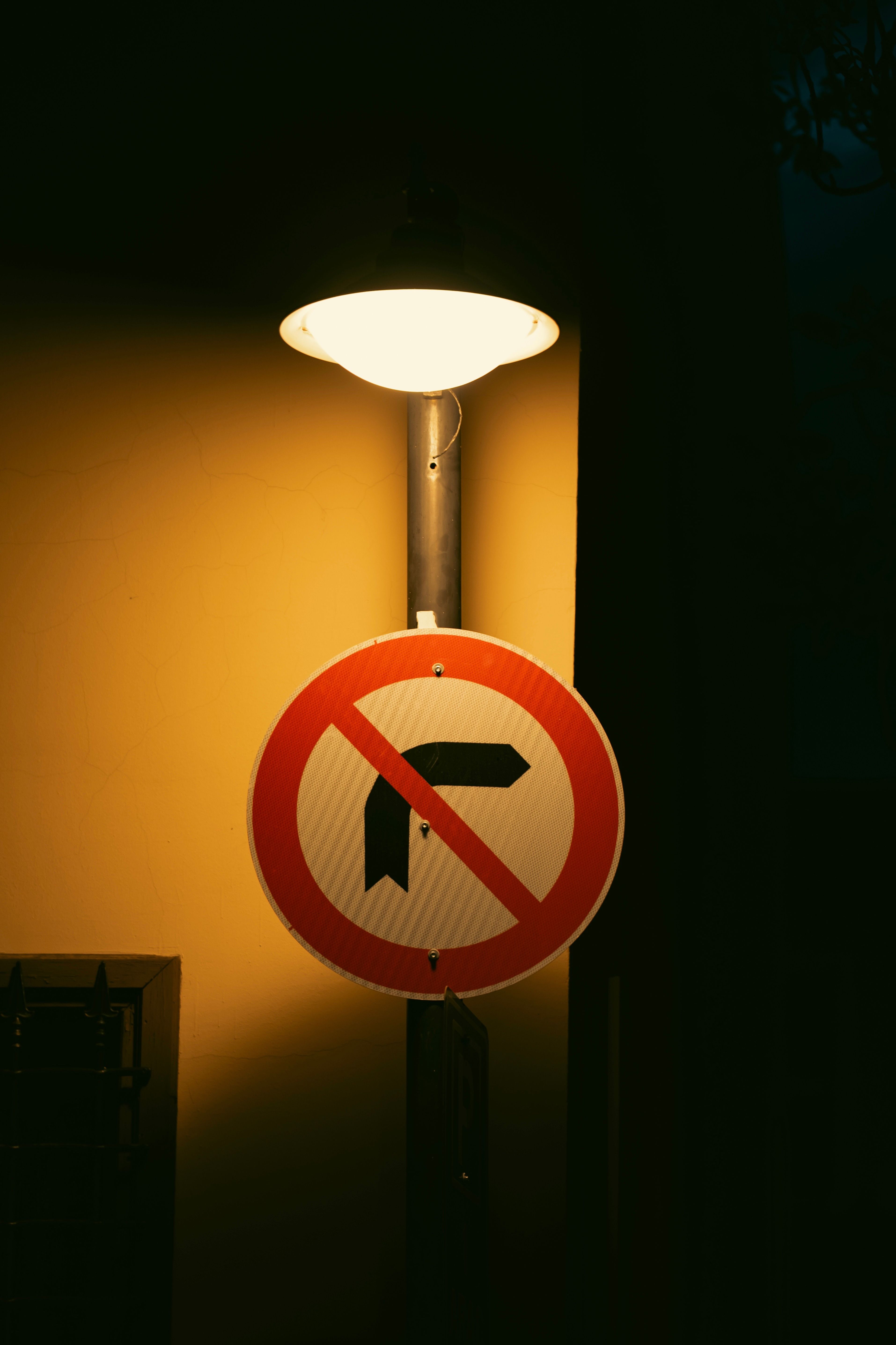No Right Turn Sign Under Streetlight at Night · Free Stock Photo