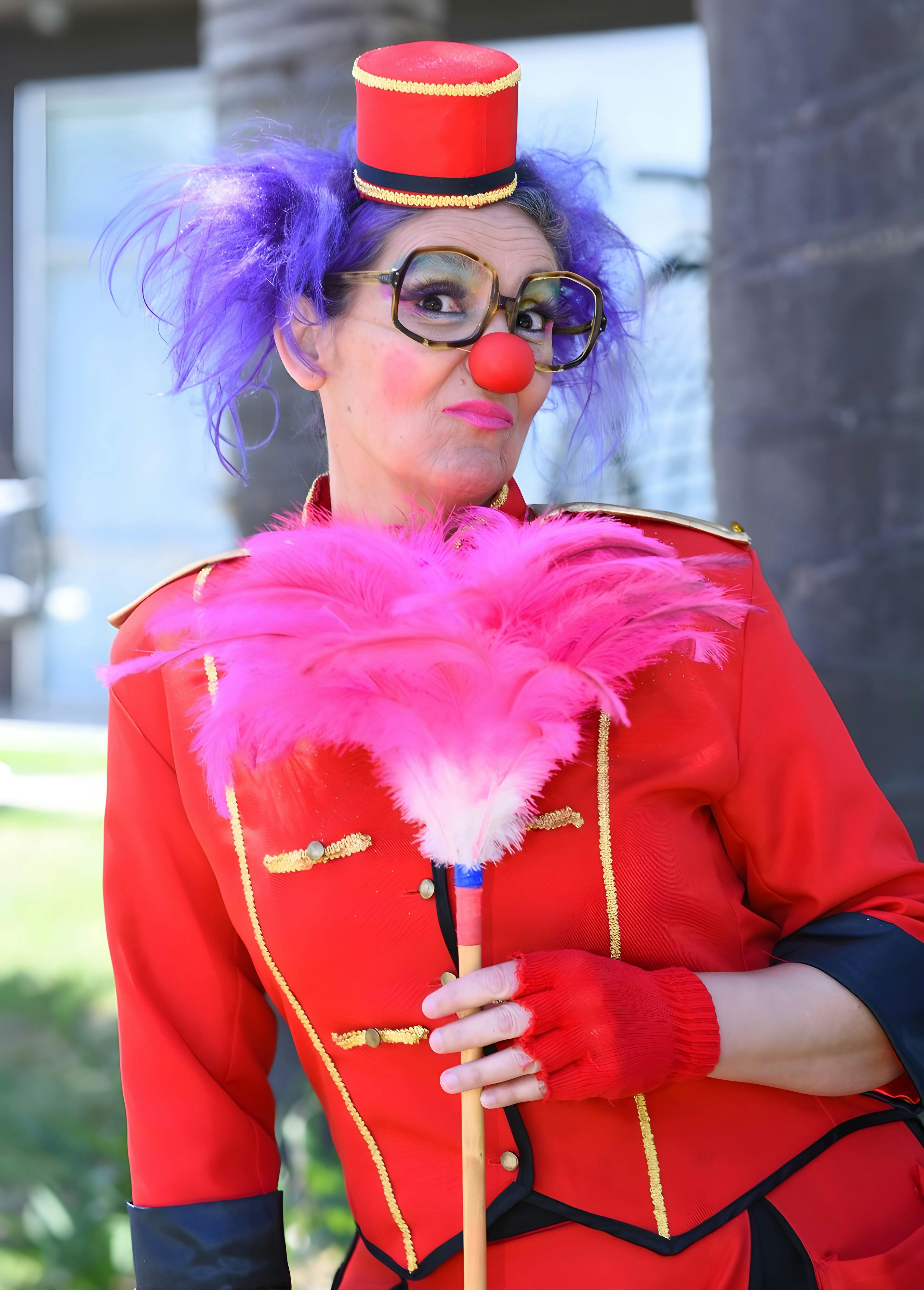 Colorful Circus Performer in Red Costume · Free Stock Photo