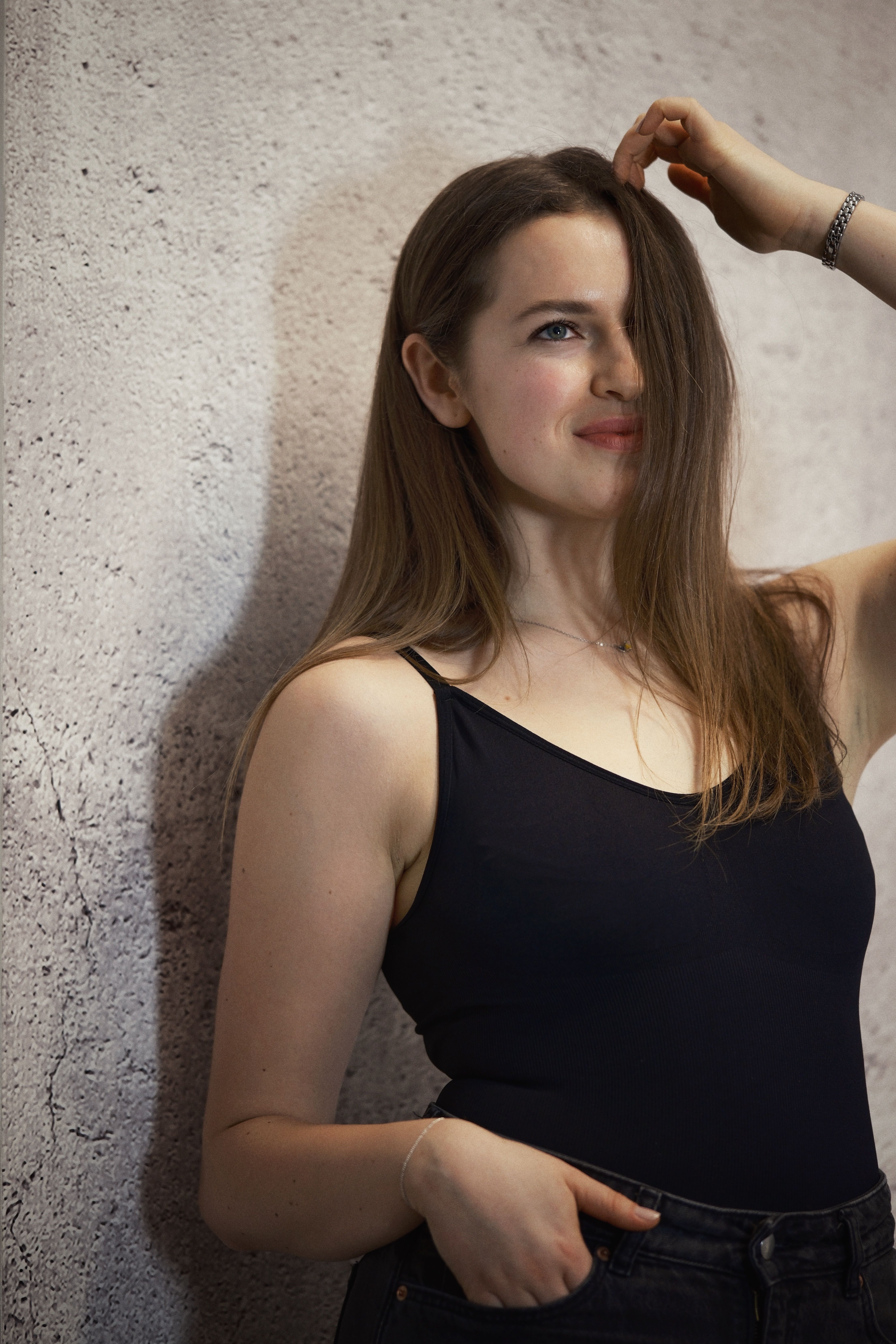 Casual Portrait of a Young Woman Posing Indoors · Free Stock Photo
