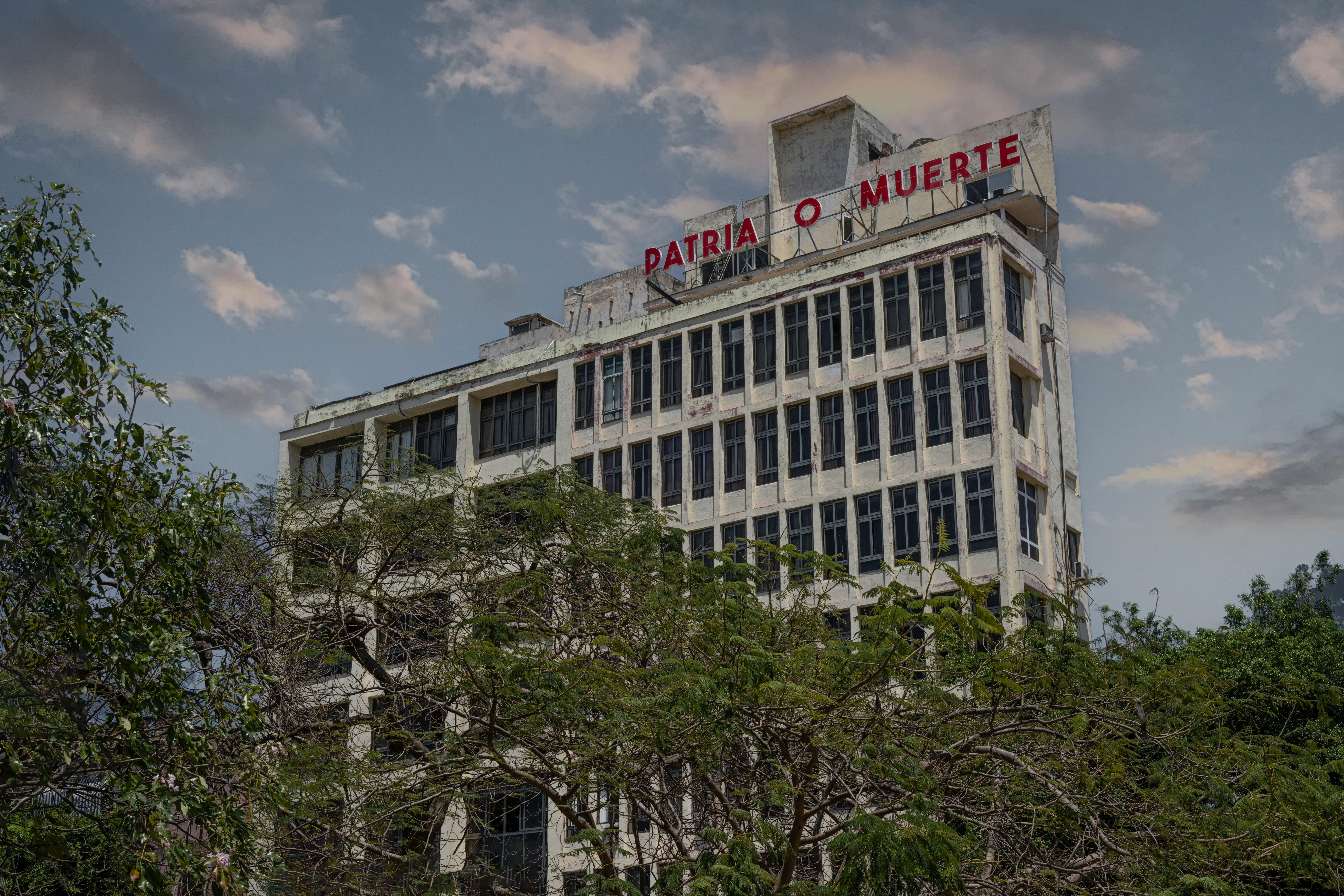 Iconic Building with Patria o Muerte Sign in Havana · Free Stock Photo