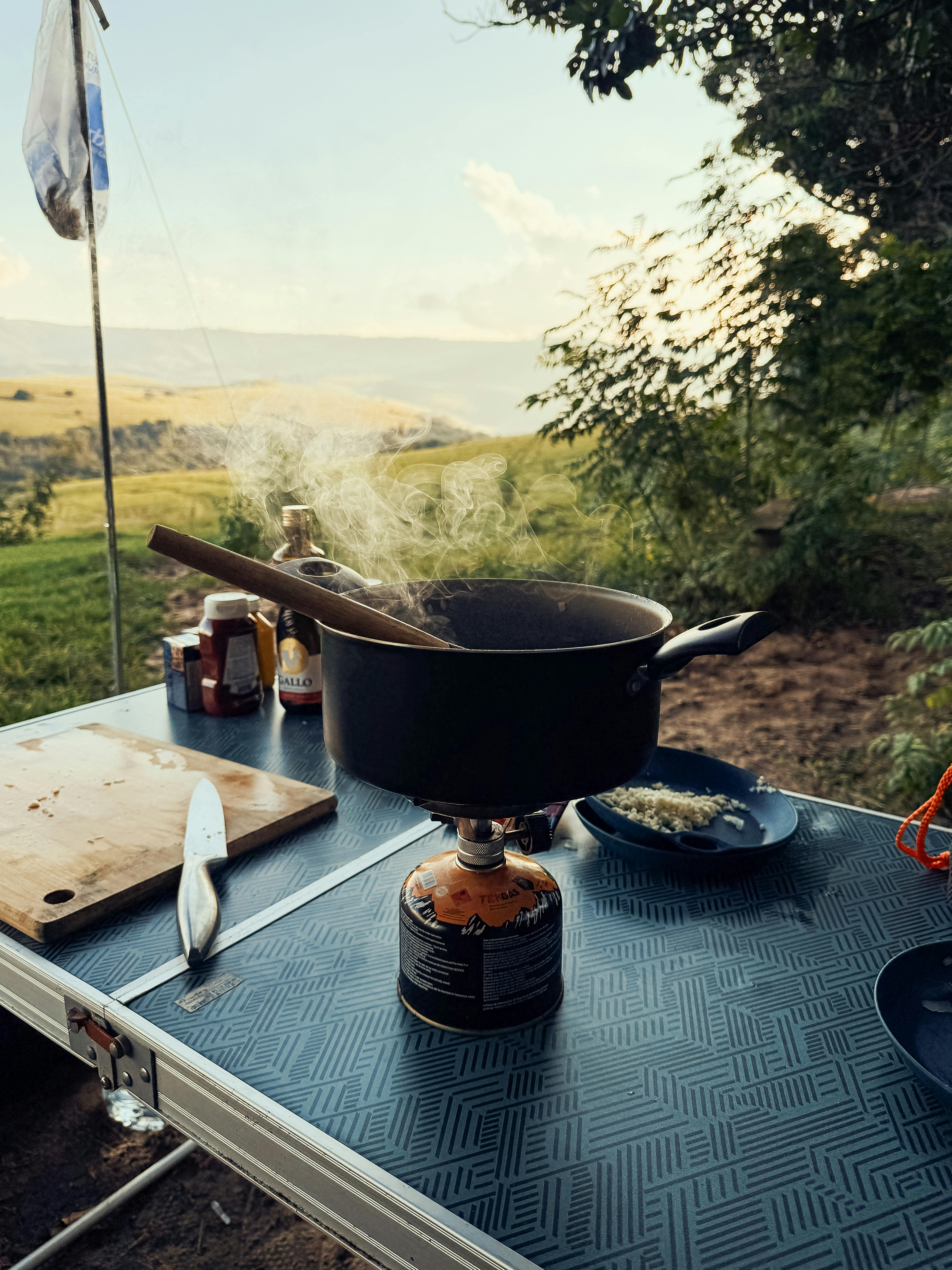 Outdoor Camping Cooking Setup with Smoky Pot · Free Stock Photo