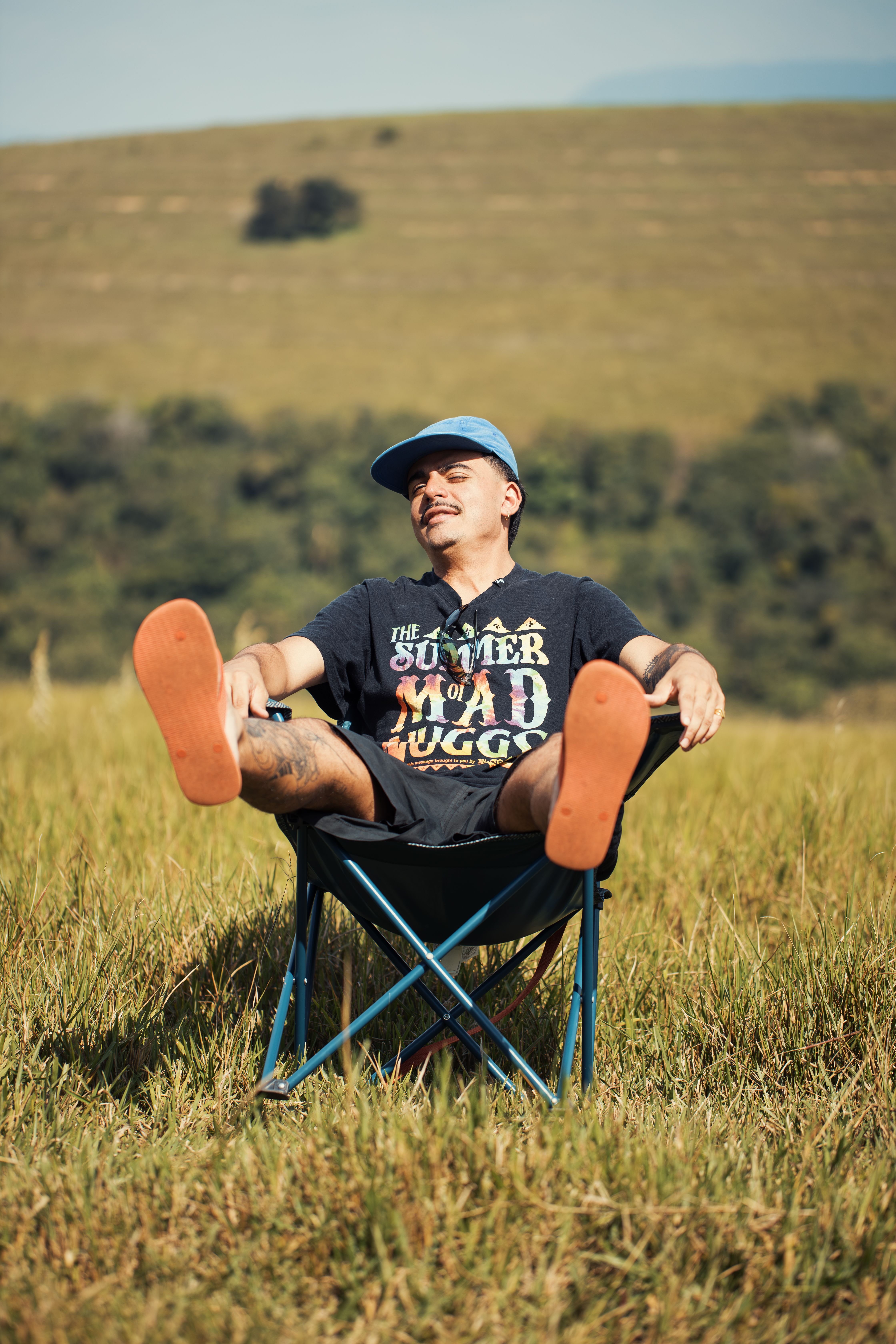 Man Relaxing Outdoors on a Sunny Day · Free Stock Photo