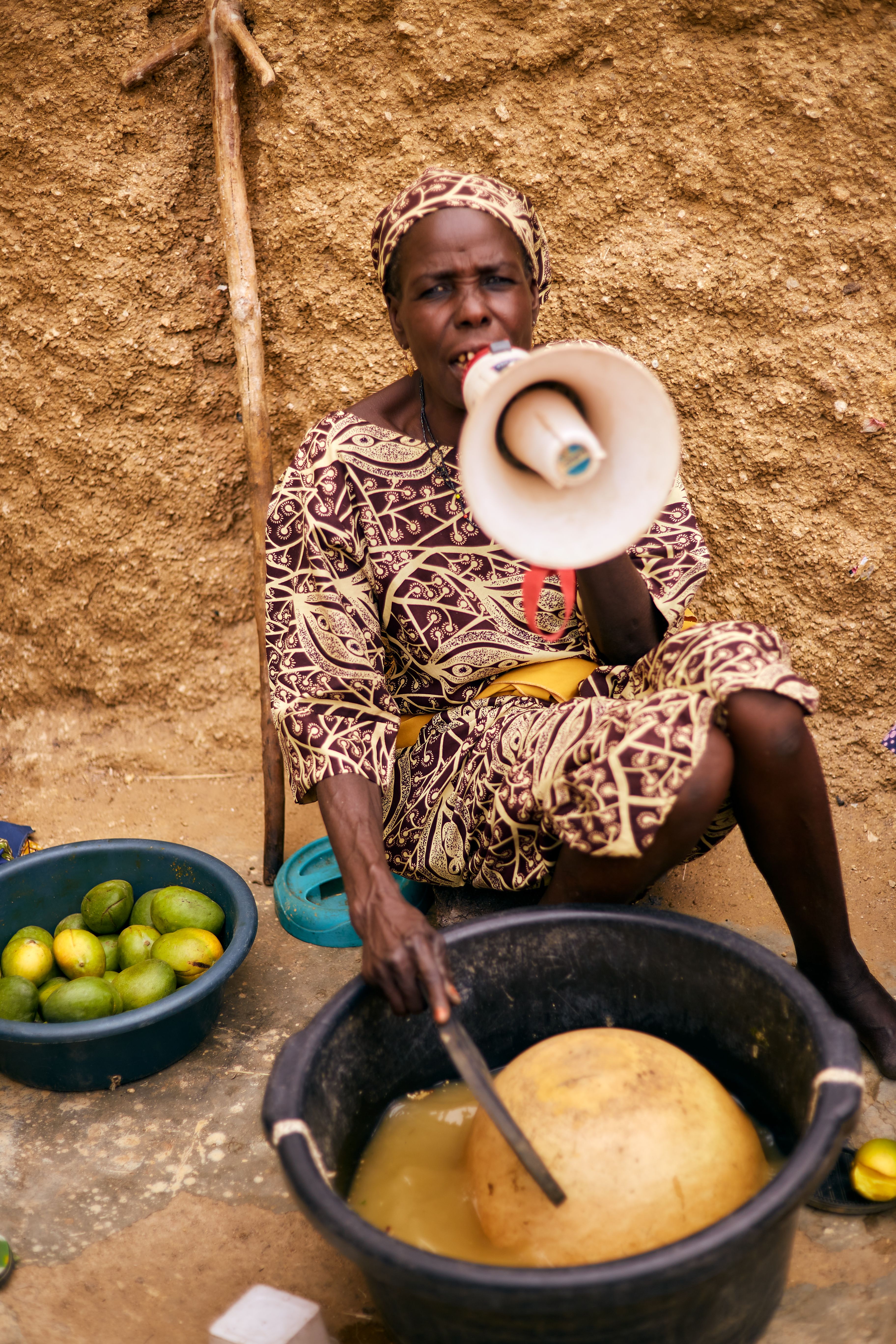 Traditional African Market Scene with Megaphone · Free Stock Photo
