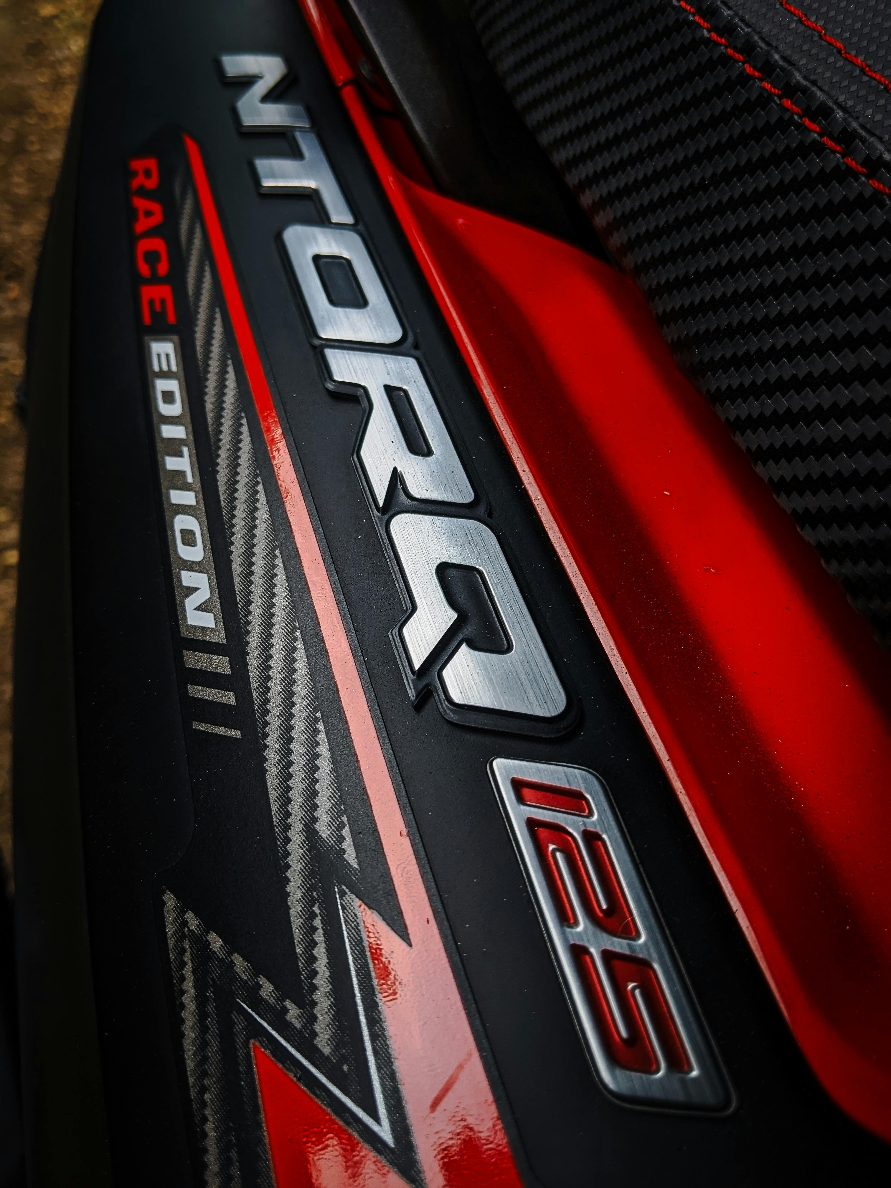 Close-Up of Red NTORQ Race Edition Motorcycle · Free Stock Photo