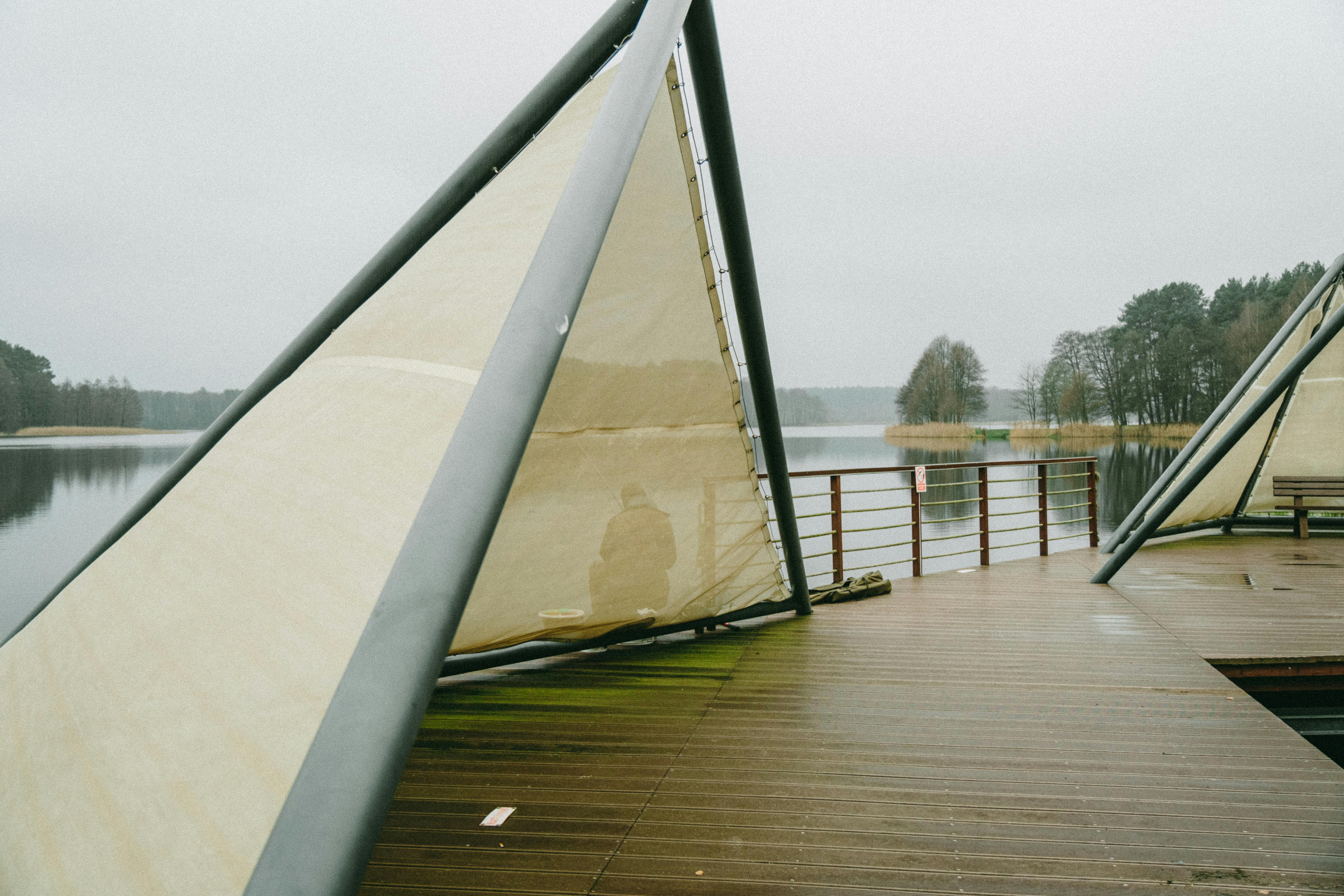 Unique Pier Architecture Over Serene Polish Lake · Free Stock Photo