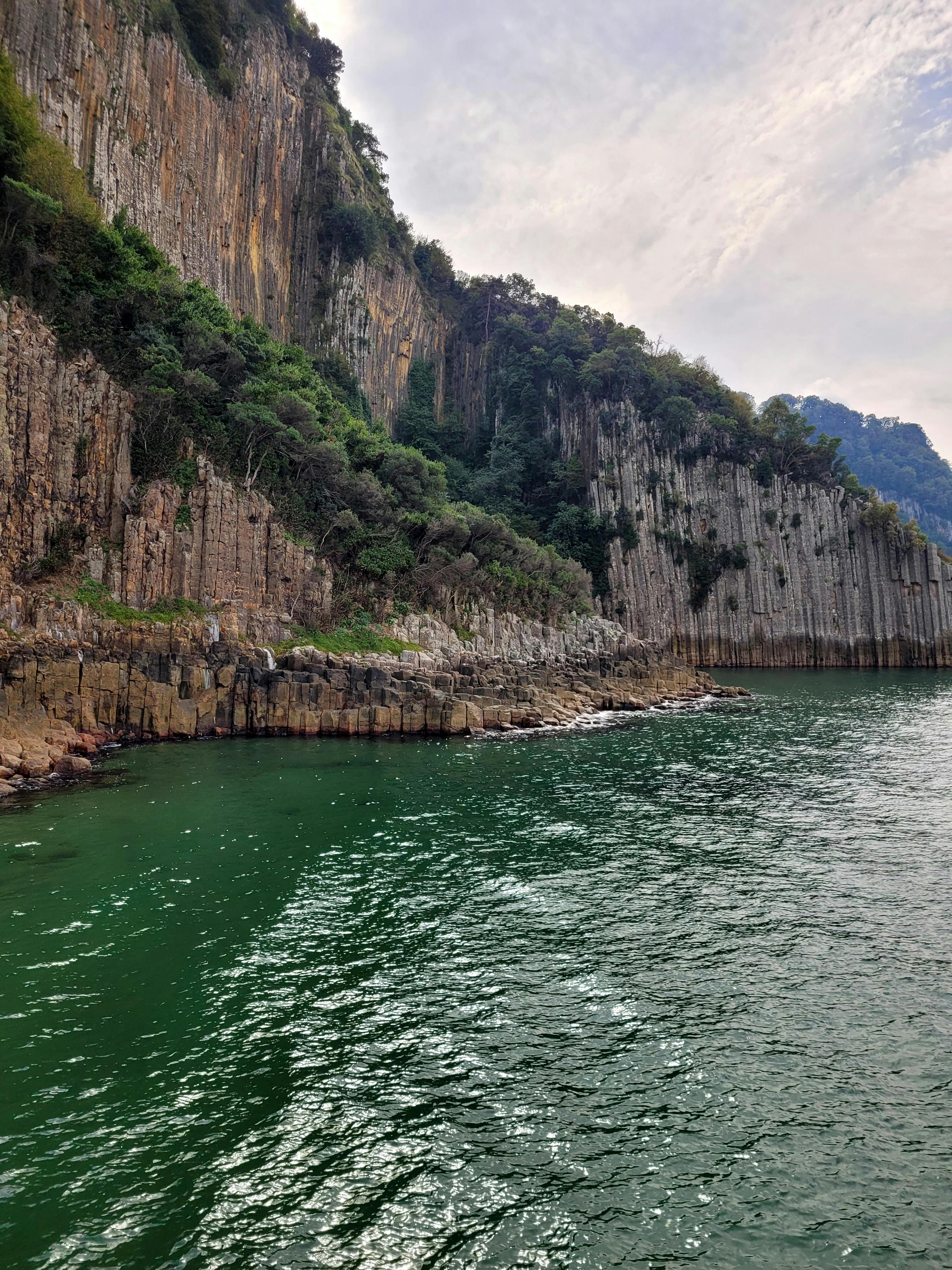 Majestic Columnar Basalt Cliffs by the Sea · Free Stock Photo
