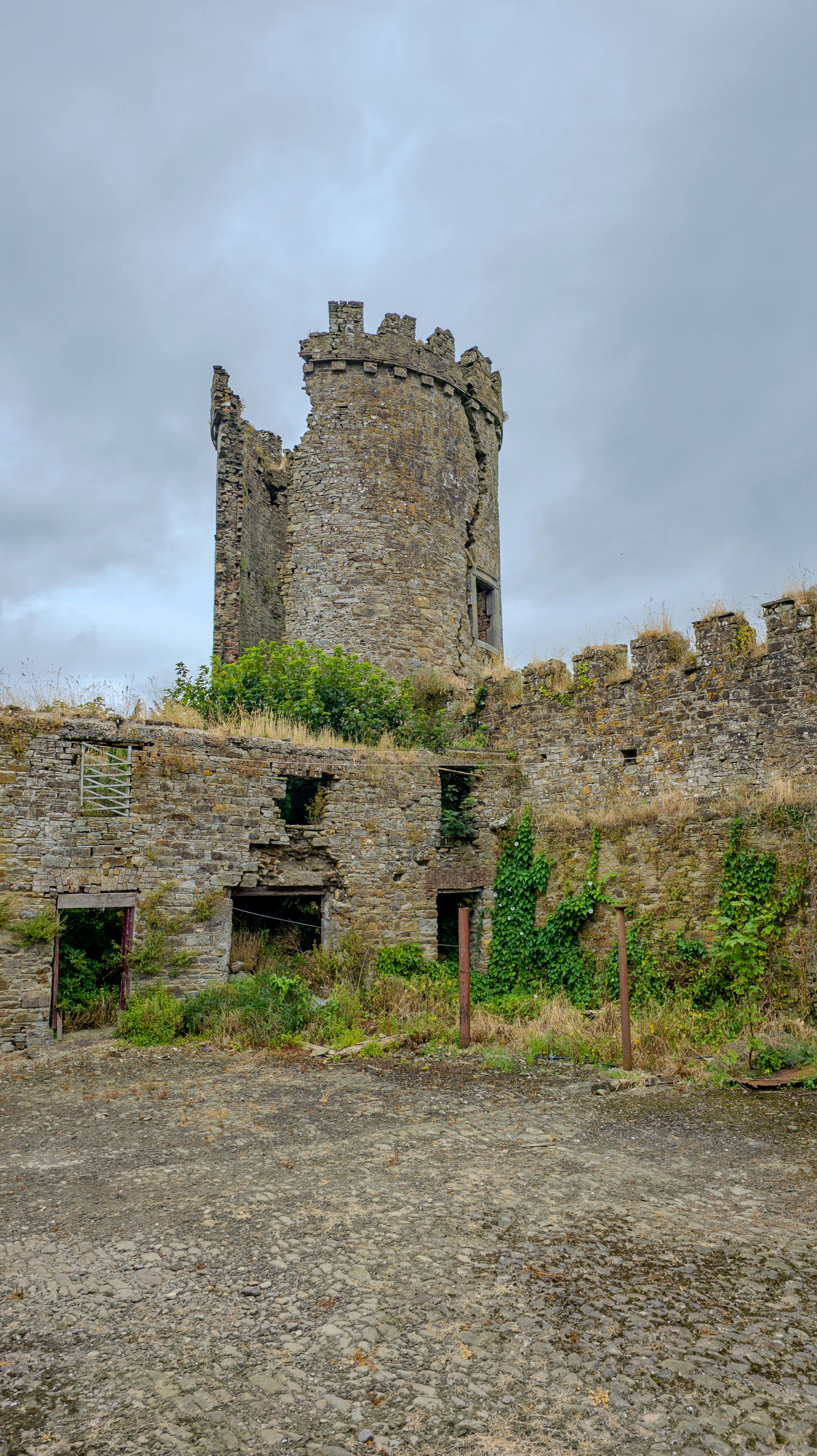 Ruined medieval castle against purple night sky · Free Stock Photo