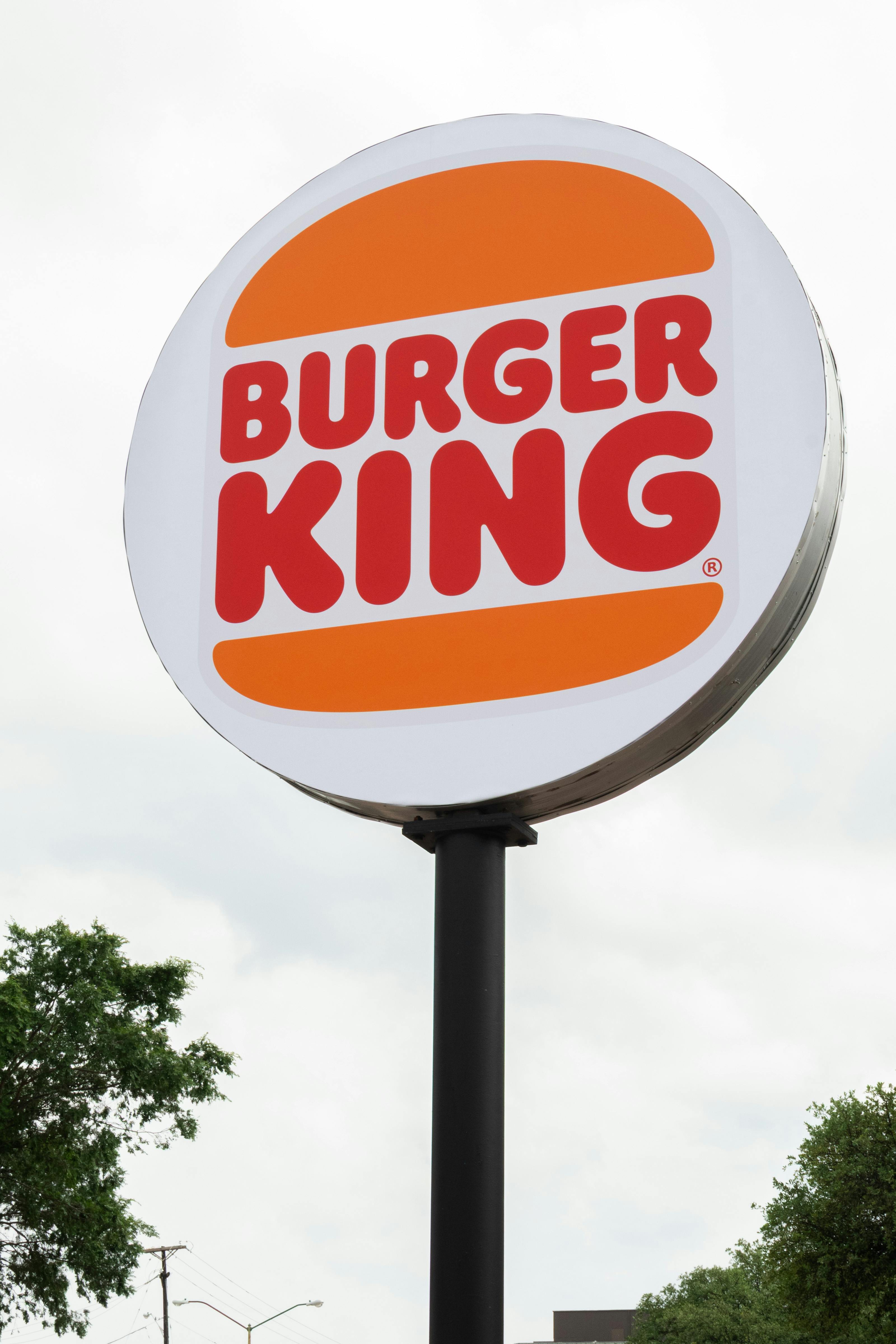 Burger King Outdoor Sign Against Cloudy Sky · Free Stock Photo