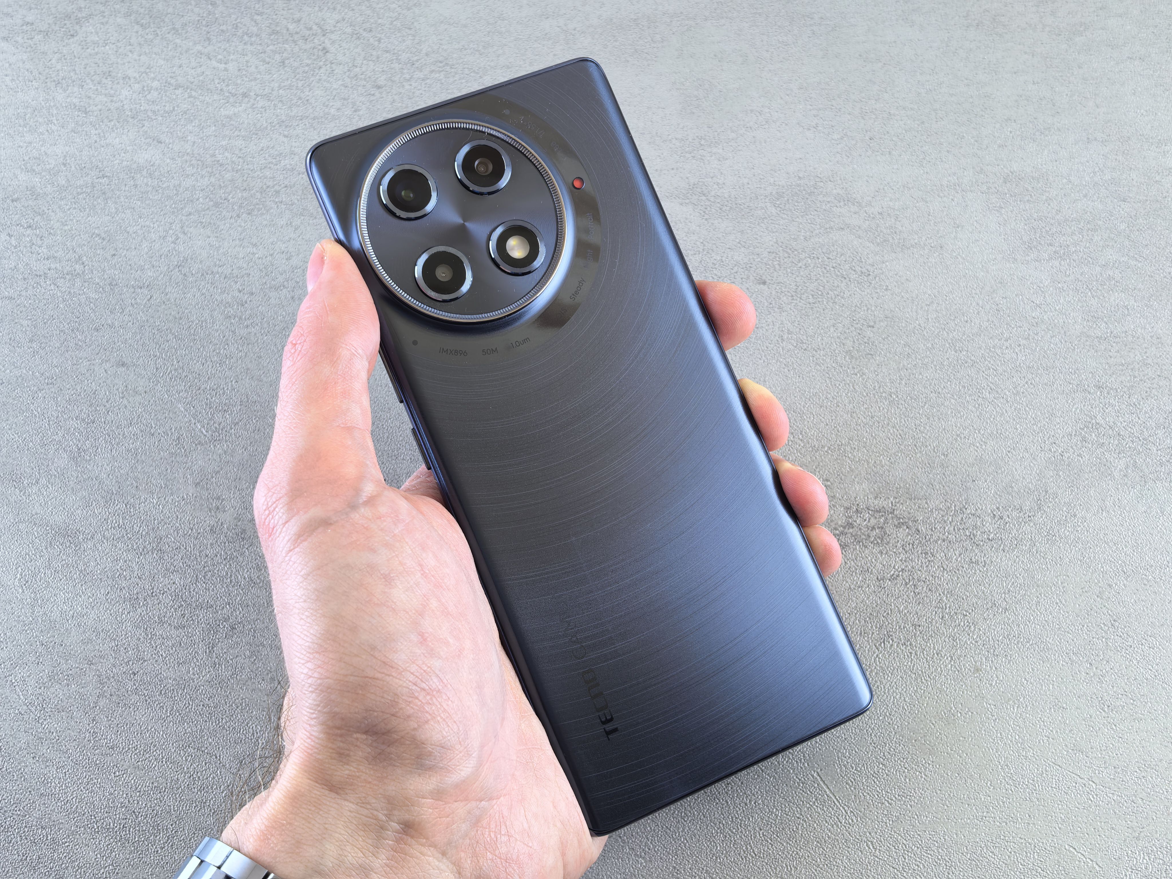 Modern Smartphone with Triple Camera Lens · Free Stock Photo