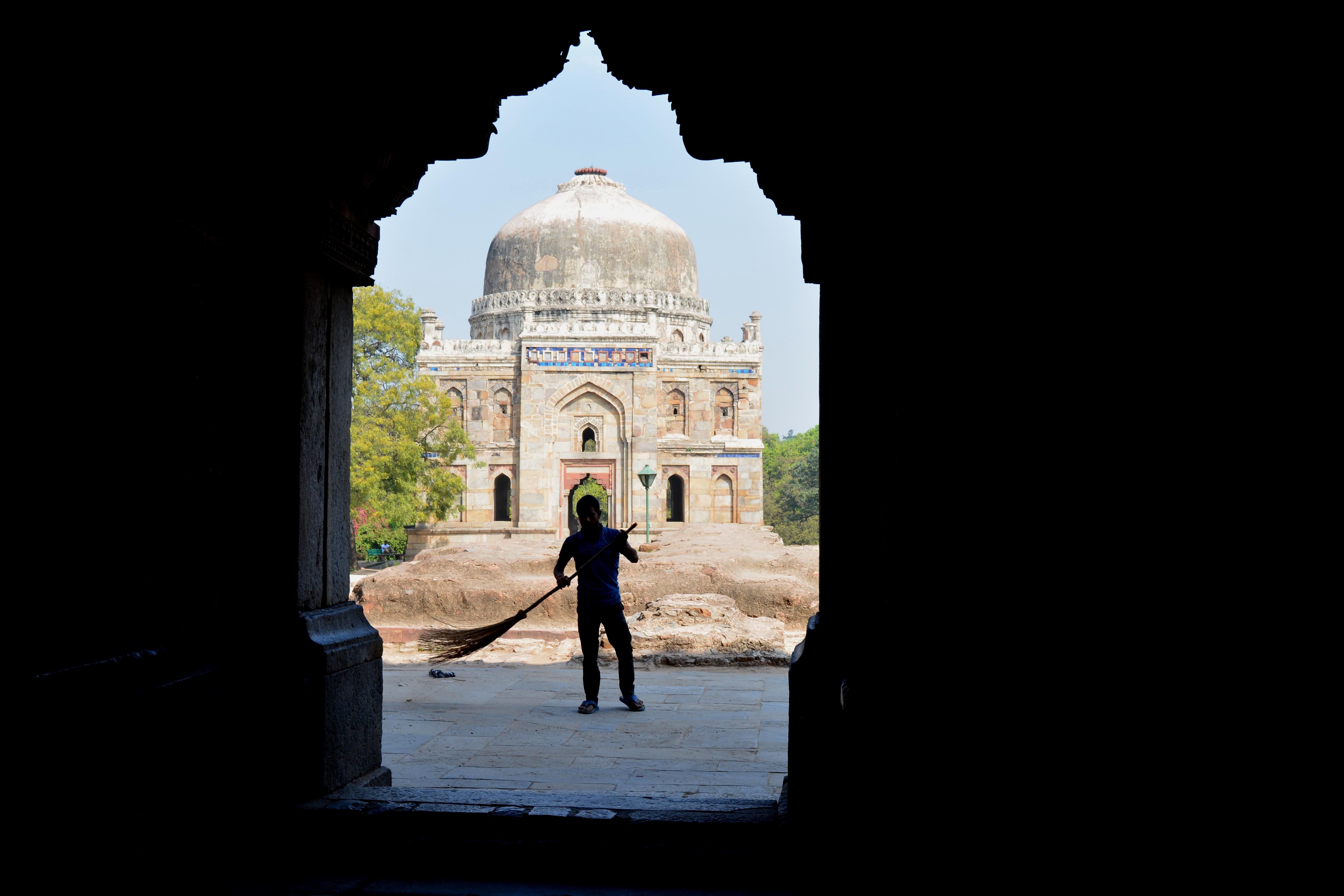 Silhouette of Person Sweeping at Lodhi Garden · Free Stock Photo