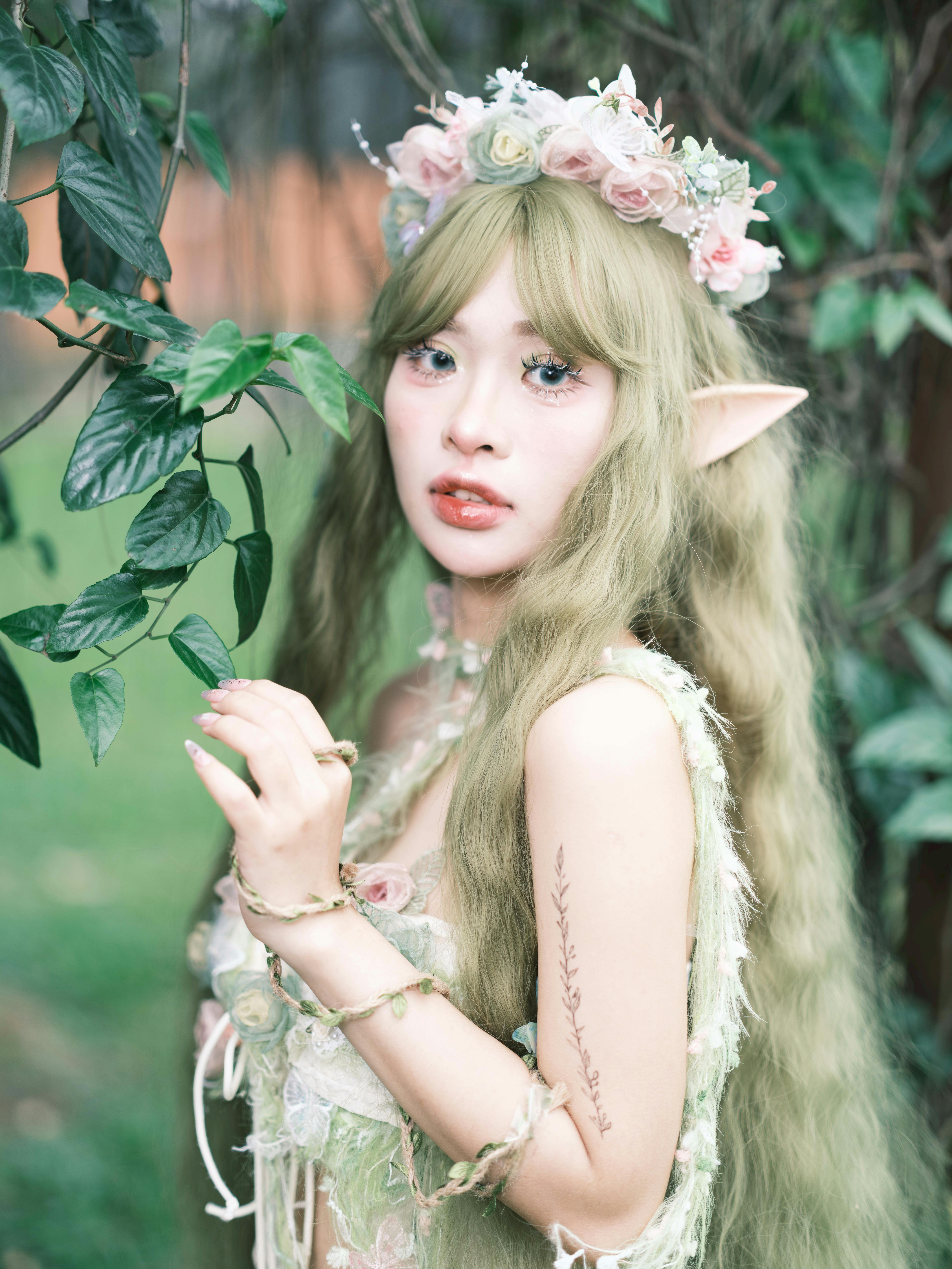 Fantasy Forest Elf with Floral Headpiece · Free Stock Photo
