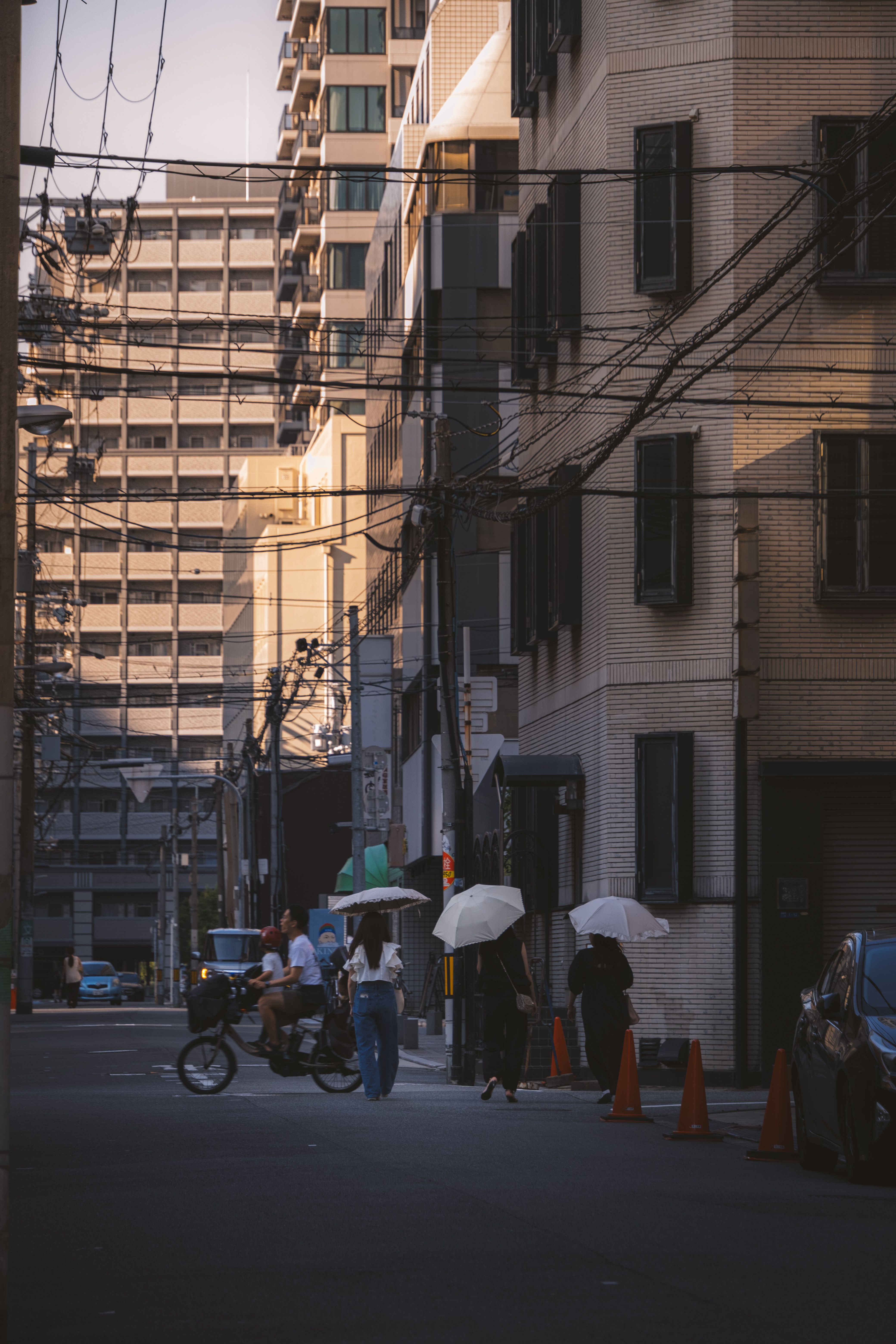 White Concrete Building Near Street with People Walking · Free Stock Photo
