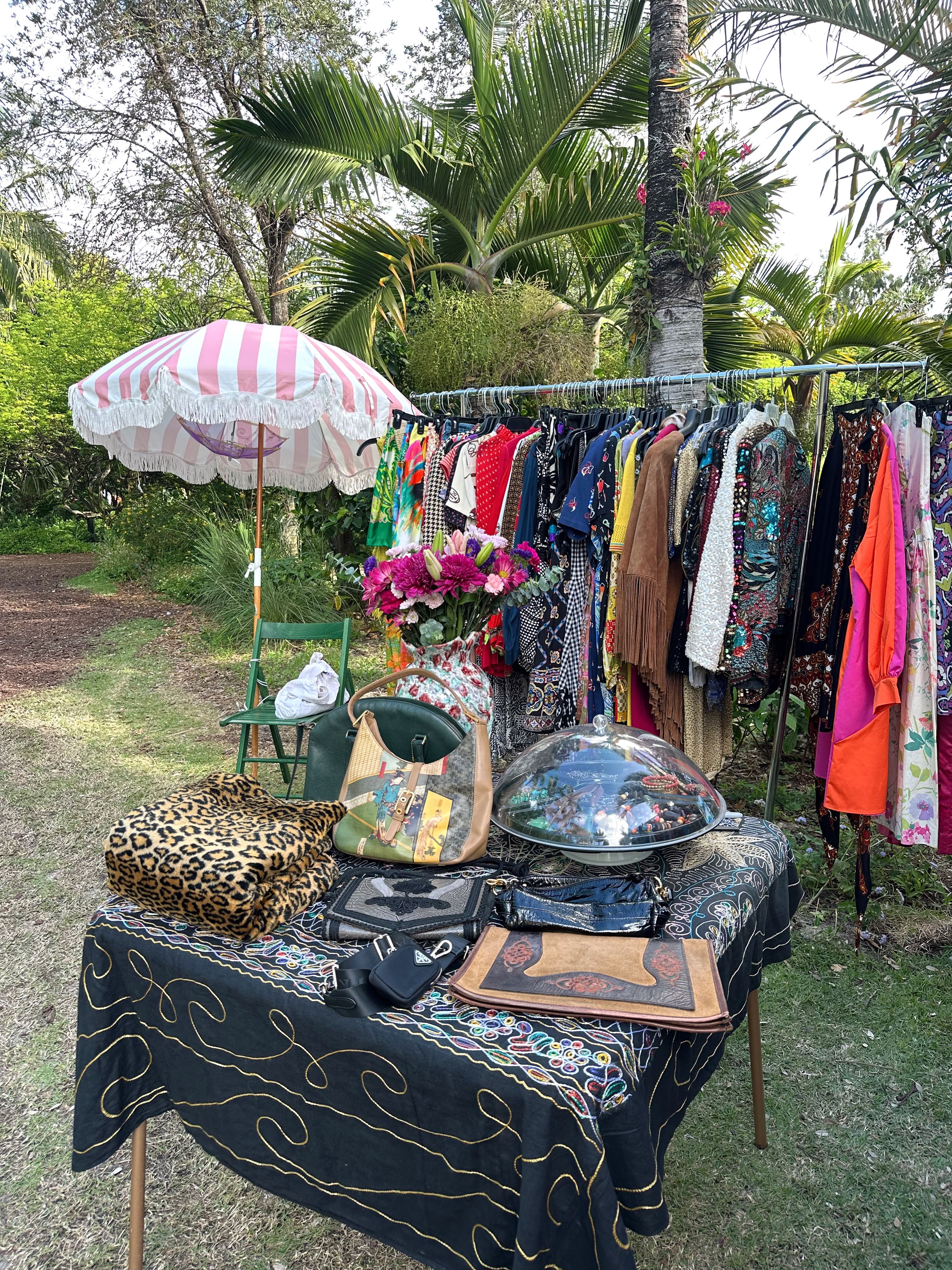 Vibrant Outdoor Flea Market with Vintage Clothes · Free Stock Photo
