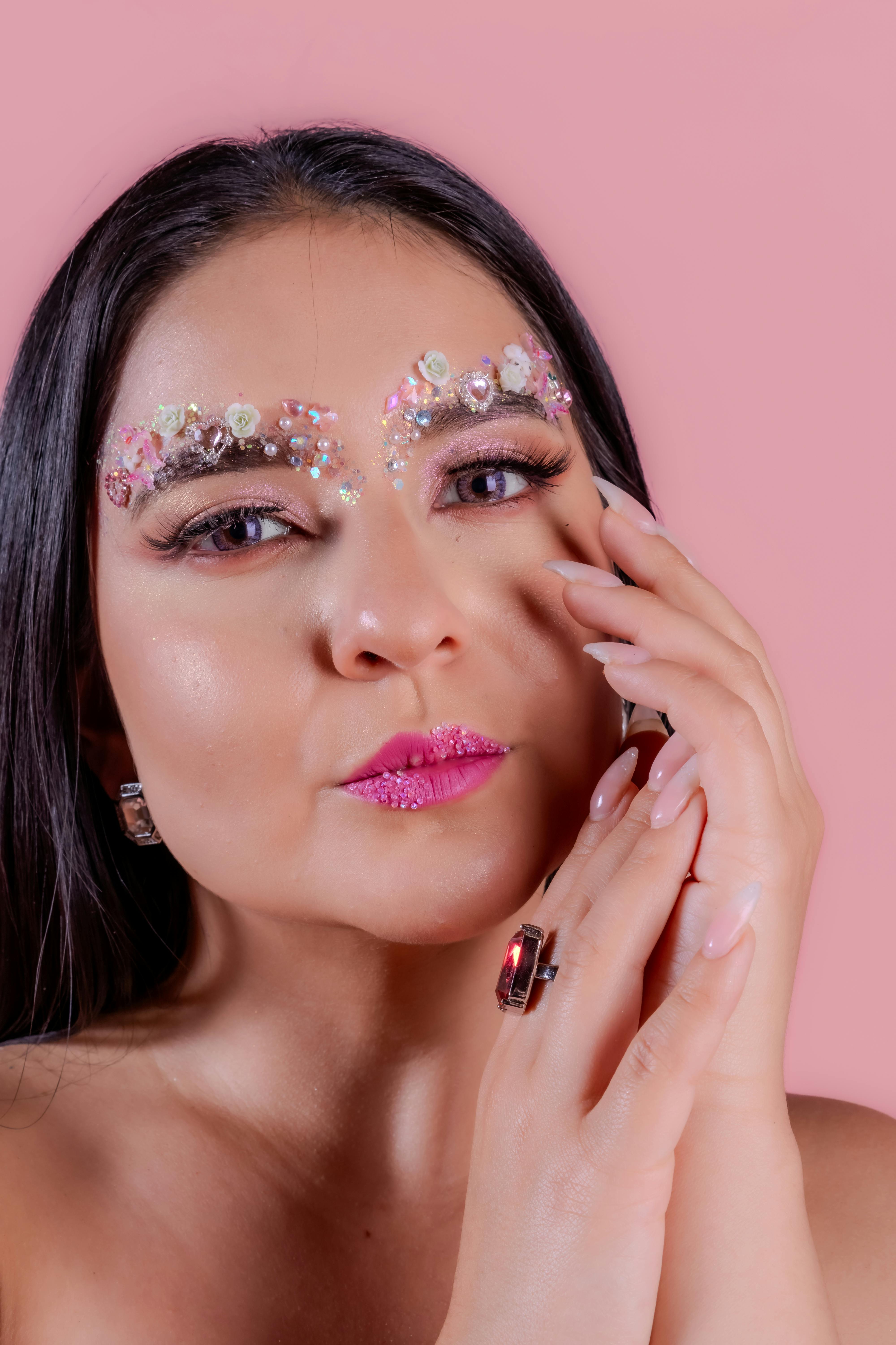 Elegant Portrait with Floral Makeup and Pink Palette · Free Stock Photo