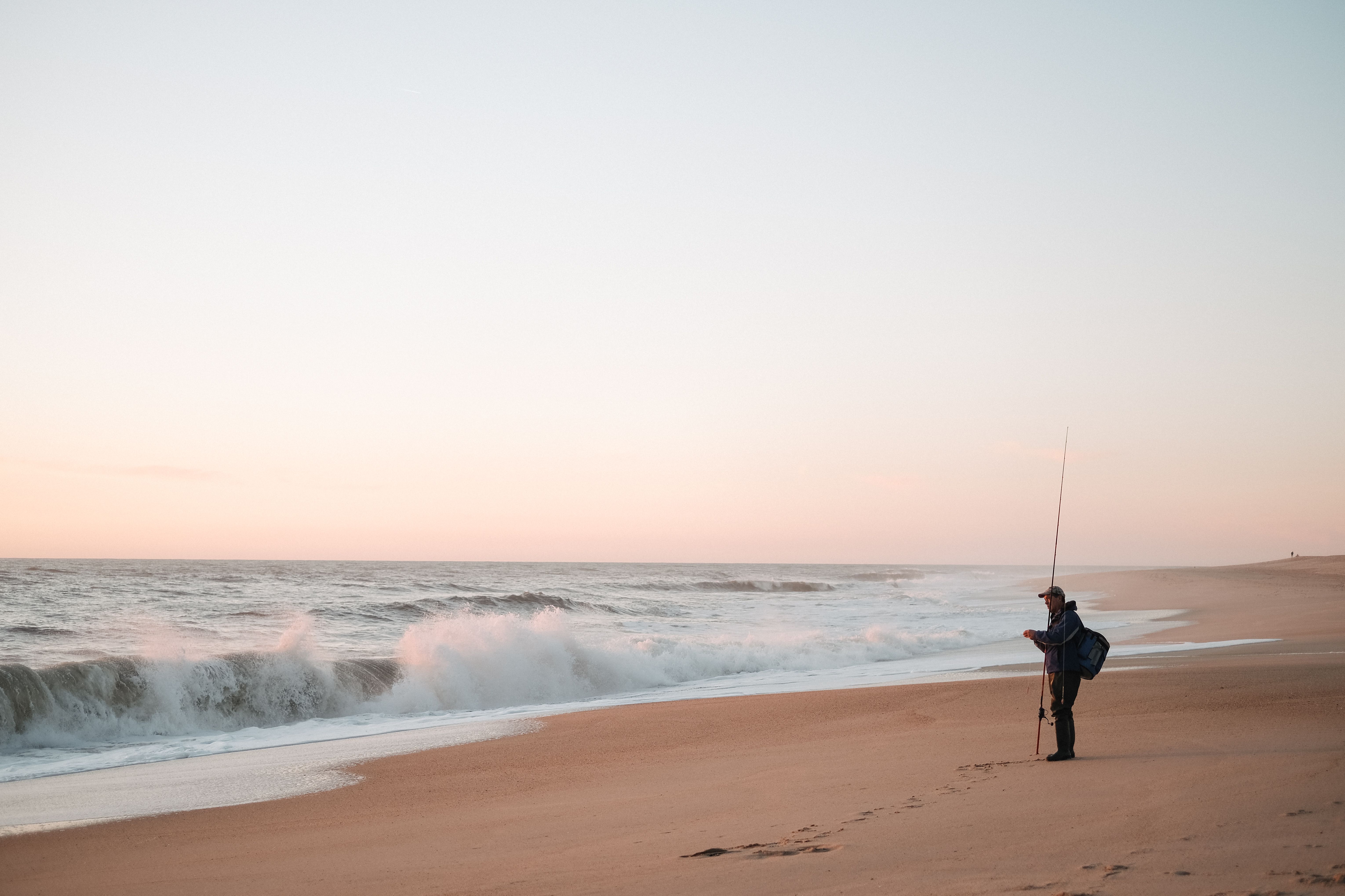 Sunset Beach Fishing by the Waves · Free Stock Photo