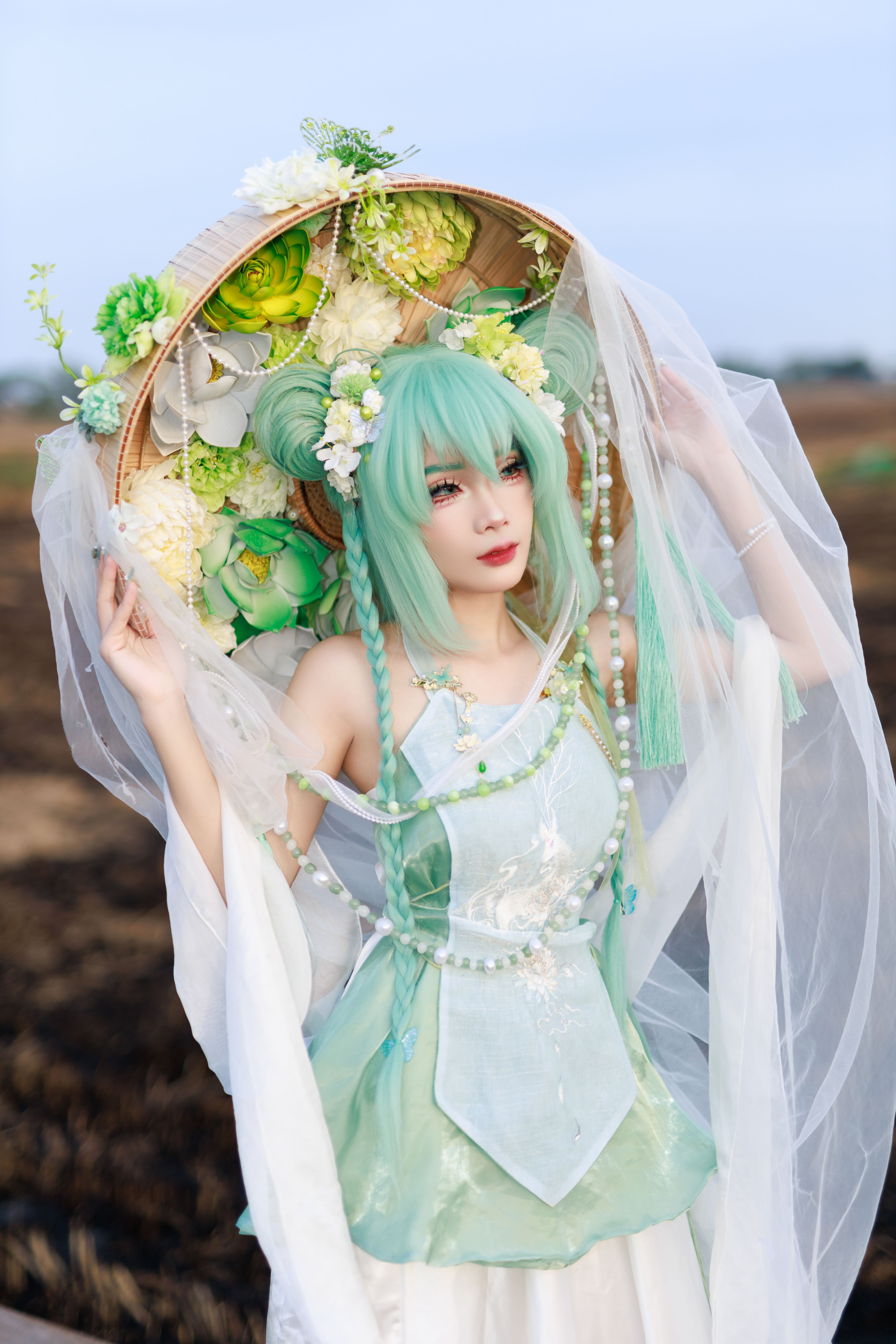 Enchanting Cosplay with Floral Parasol Outdoors · Free Stock Photo