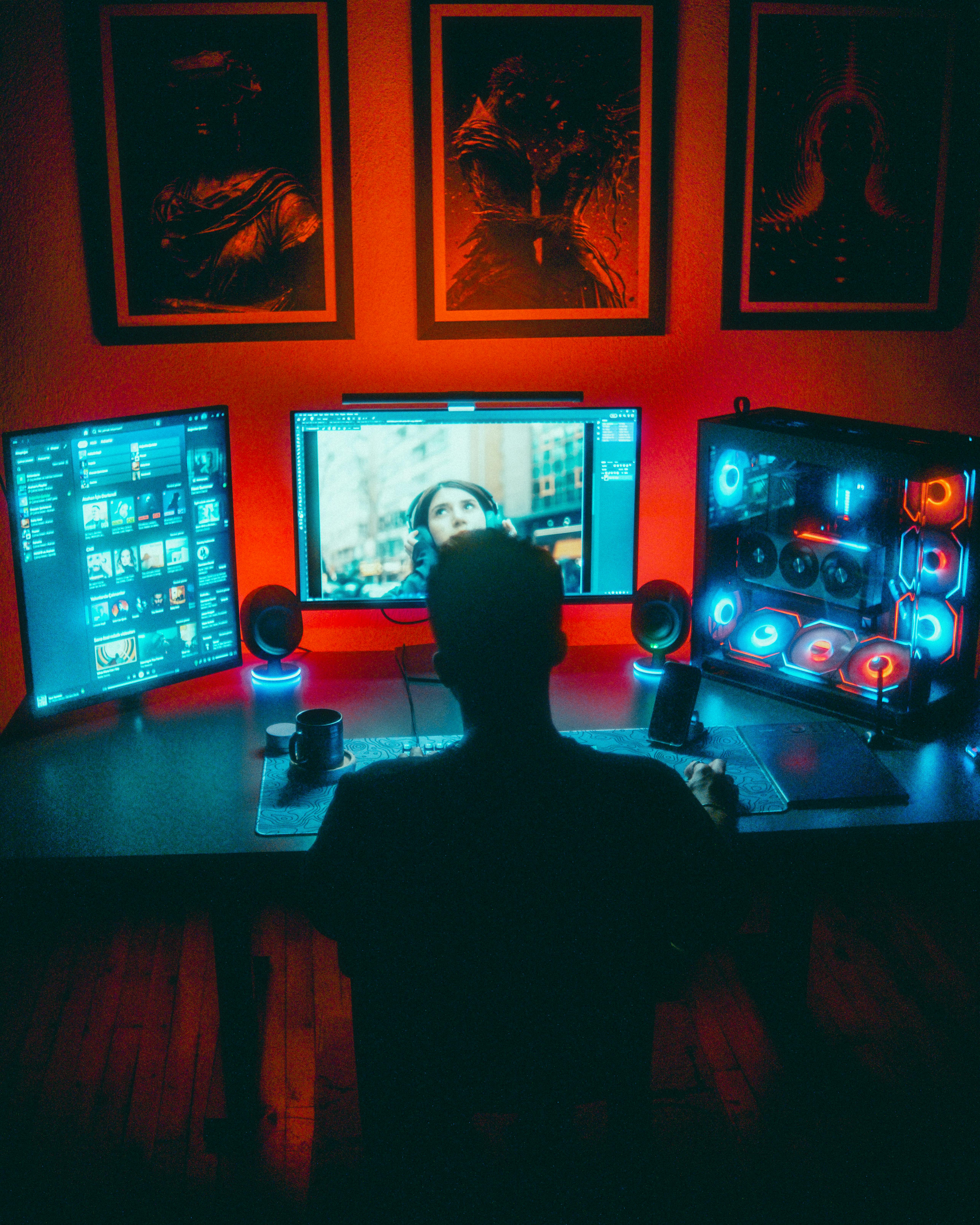 Gamer Immersed in RGB PC Setup at Night · Free Stock Photo
