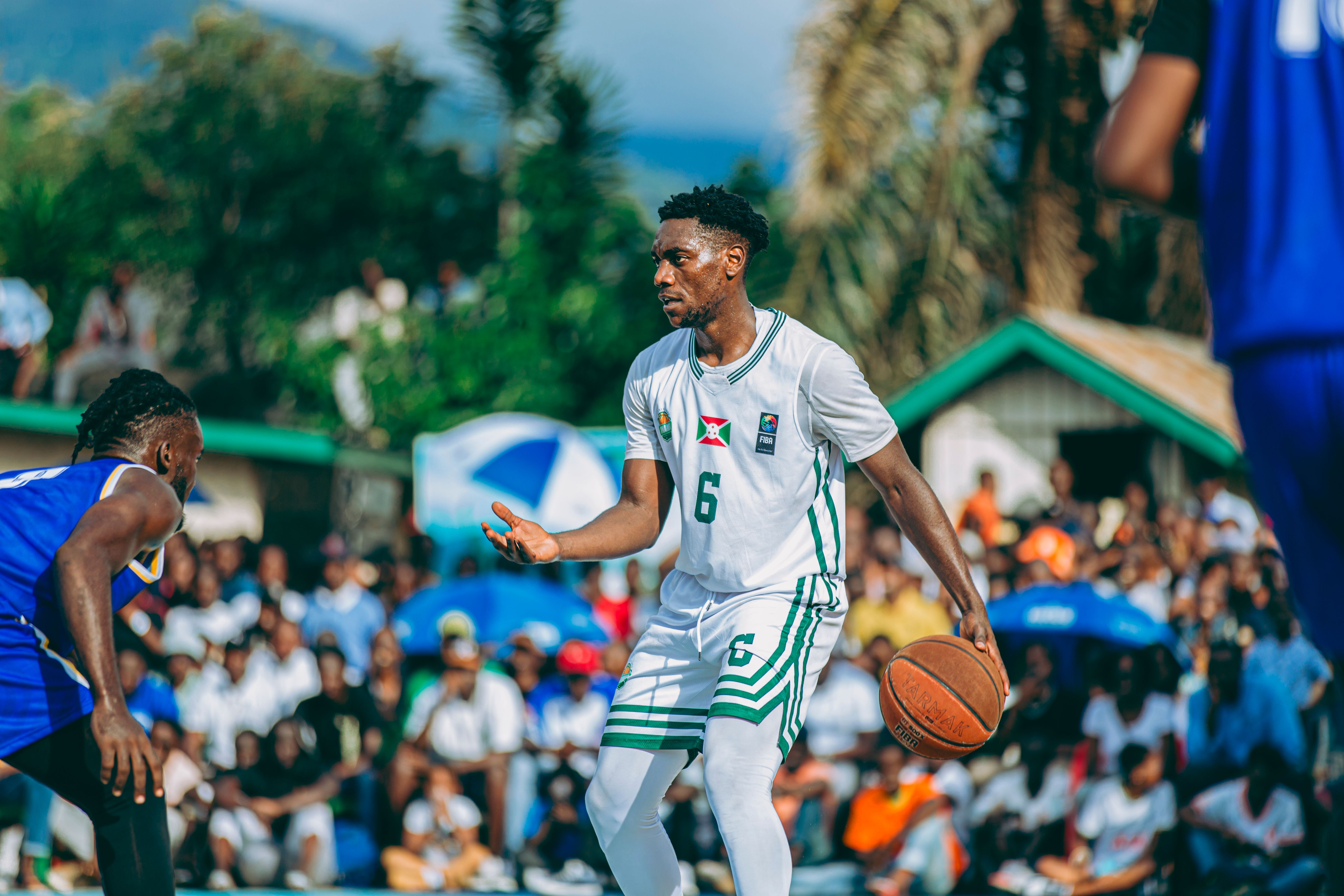 Intense Outdoor Basketball Game in Action · Free Stock Photo