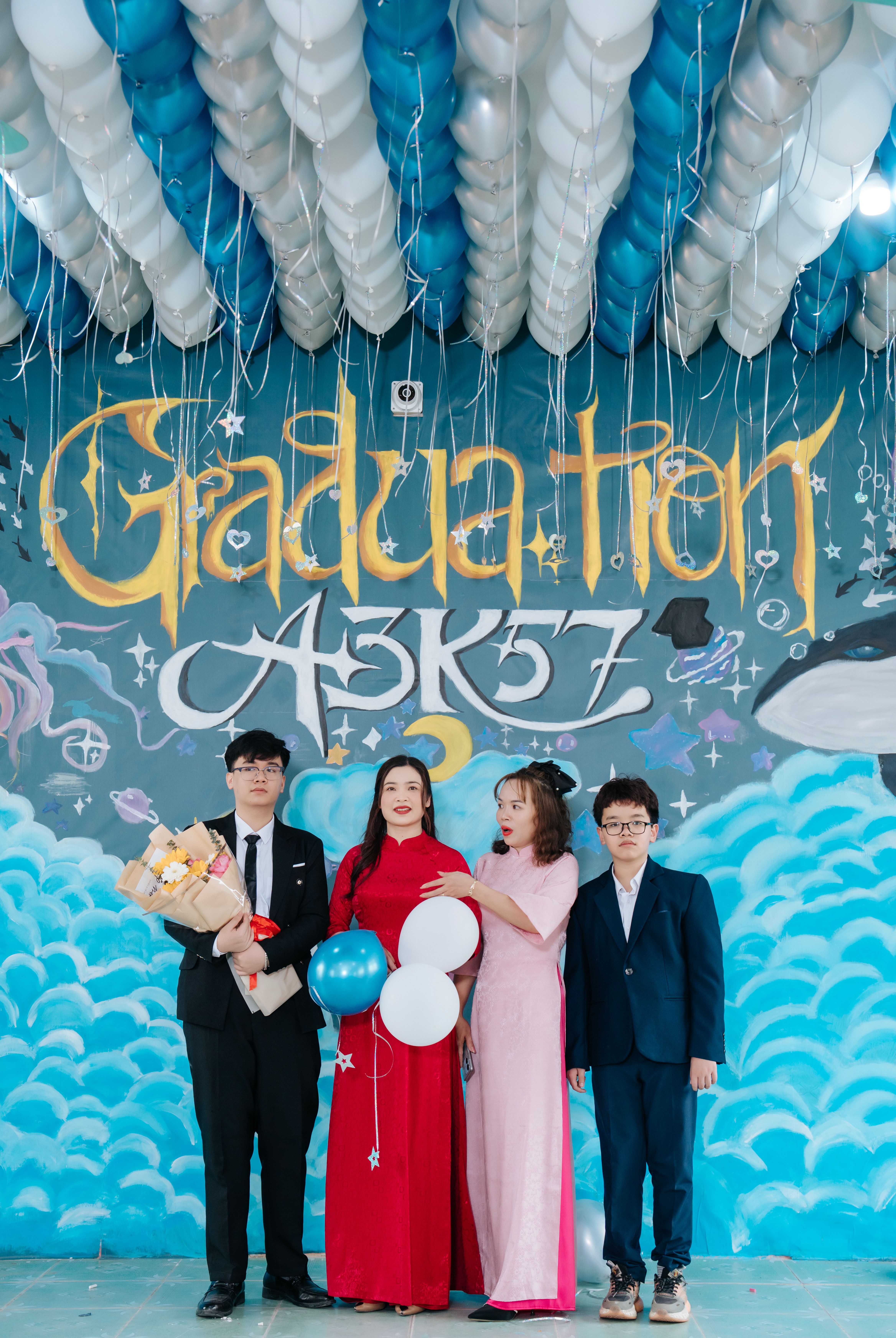 Group Graduation Celebration with Balloons · Free Stock Photo