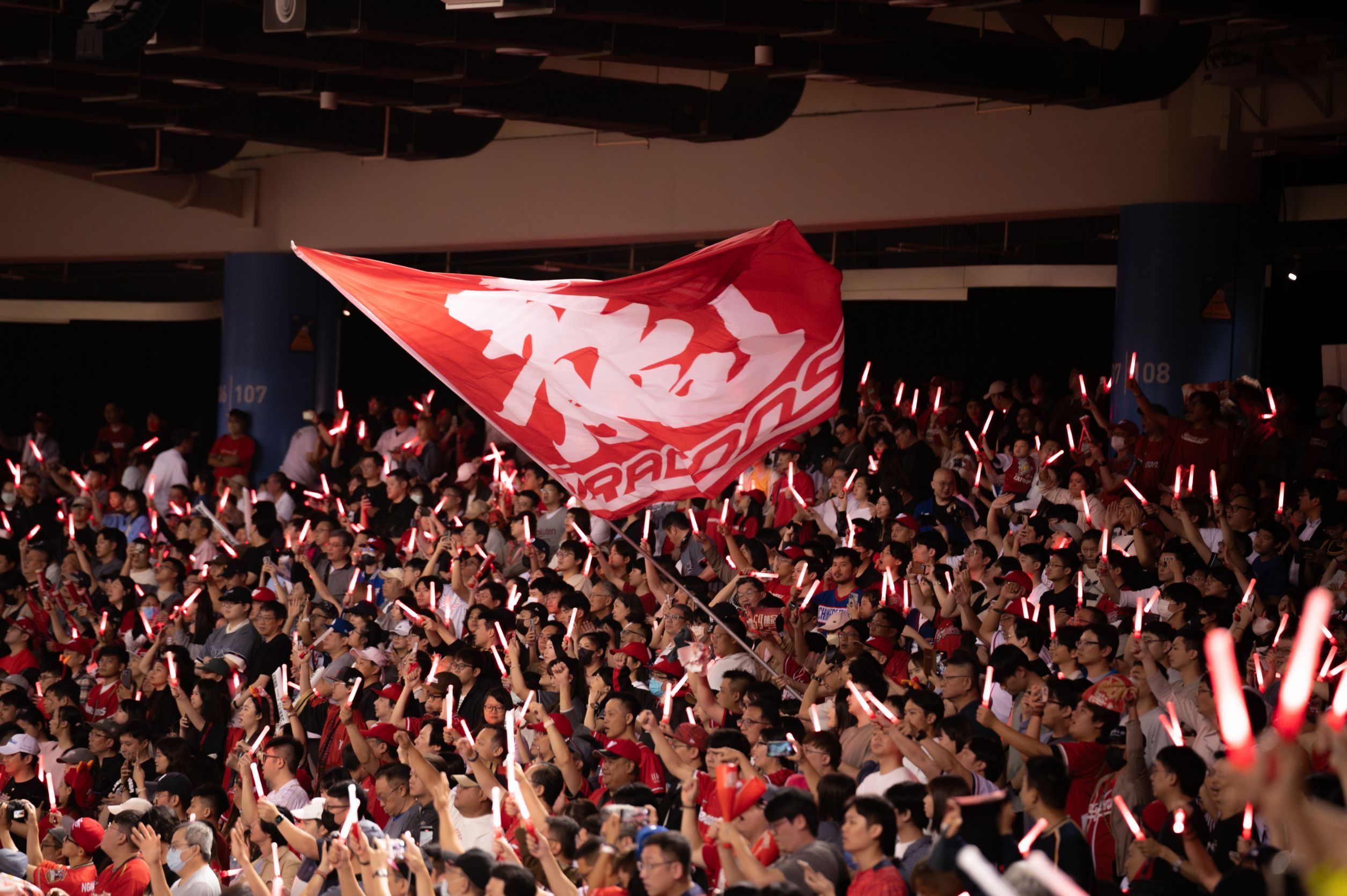 Energetic Crowd Cheering at Taipei Sports Arena · Free Stock Photo