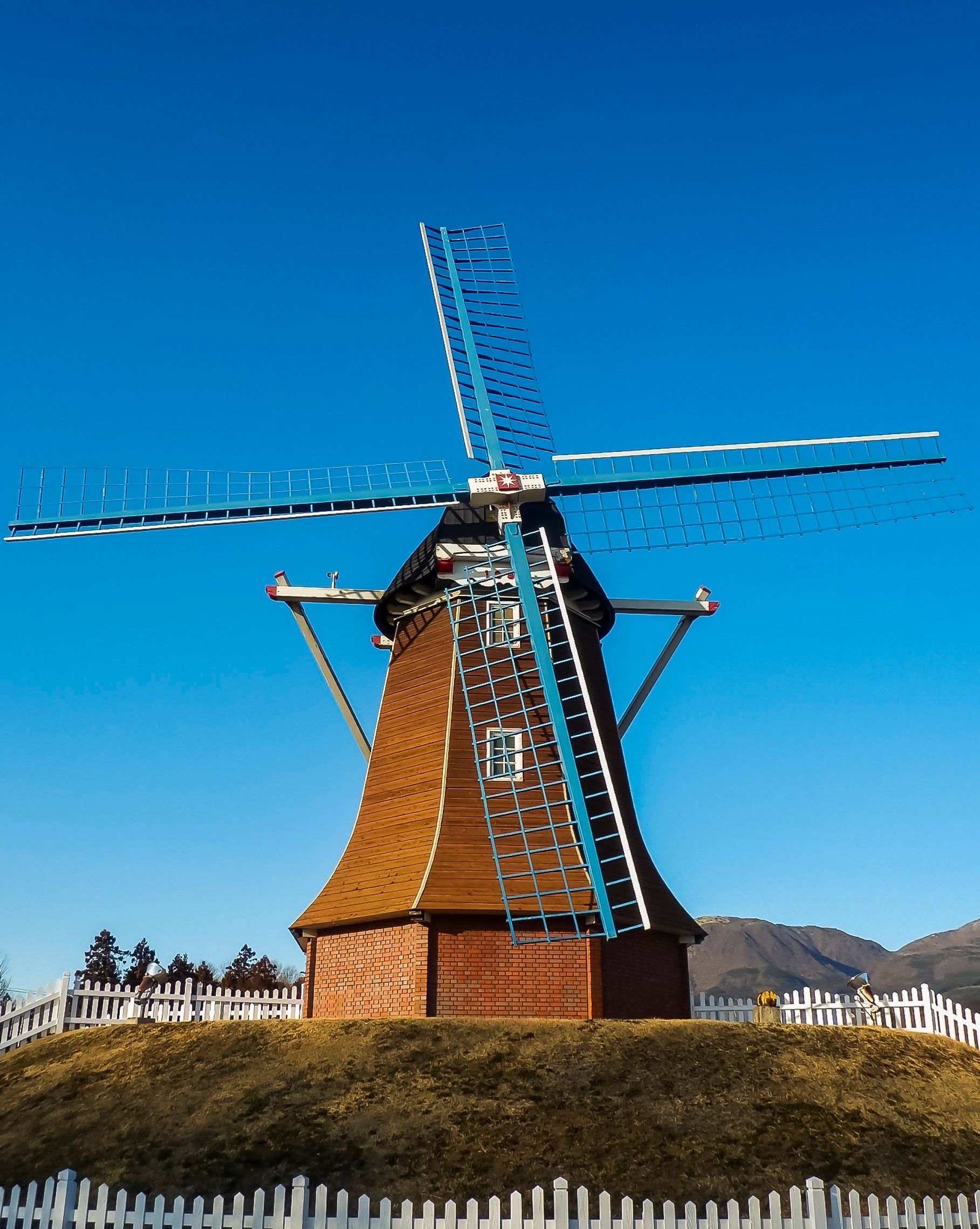 Red, White, and Blue Windmill · Free Stock Photo