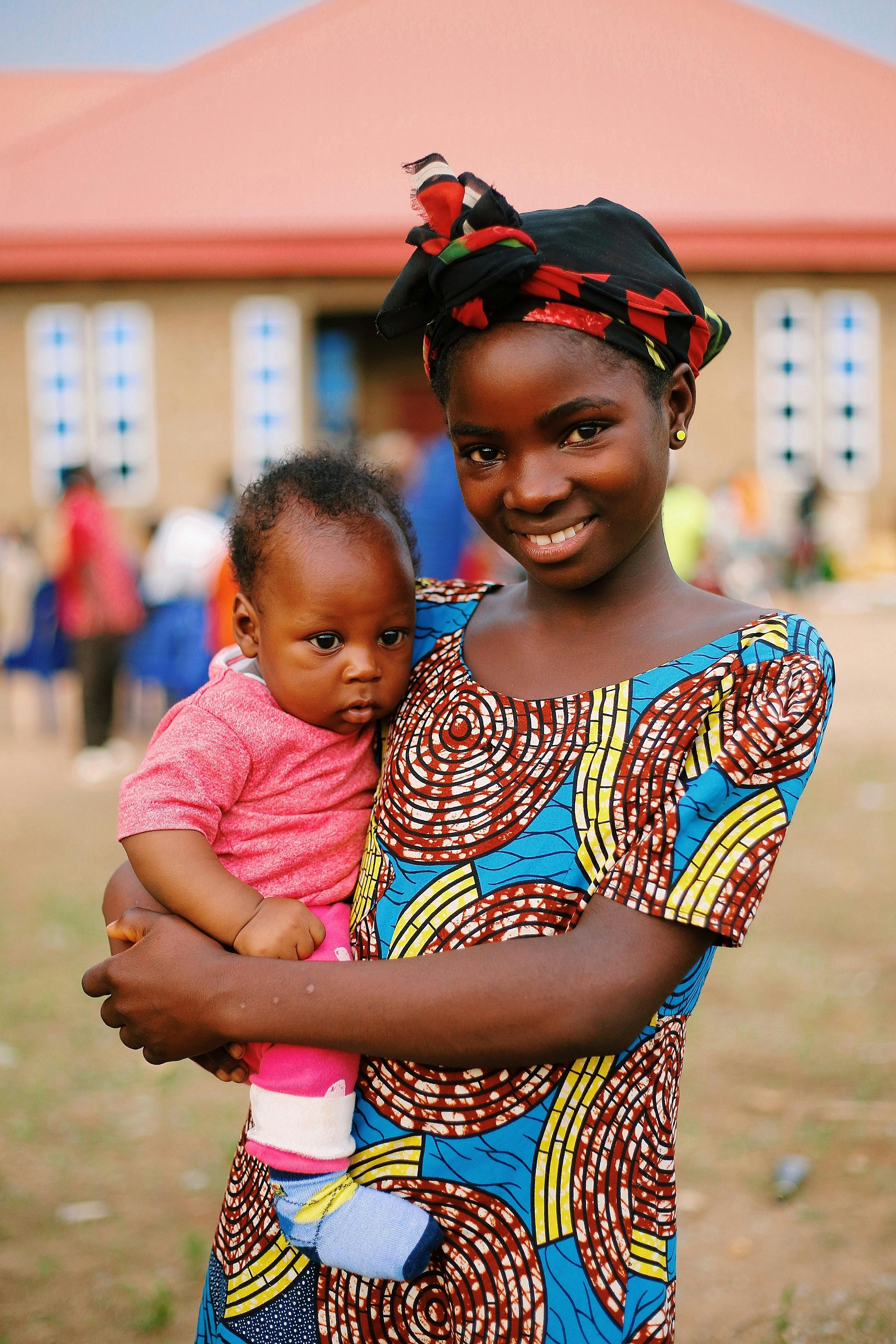 Smiling African Siblings Outdoors in Abuja · Free Stock Photo