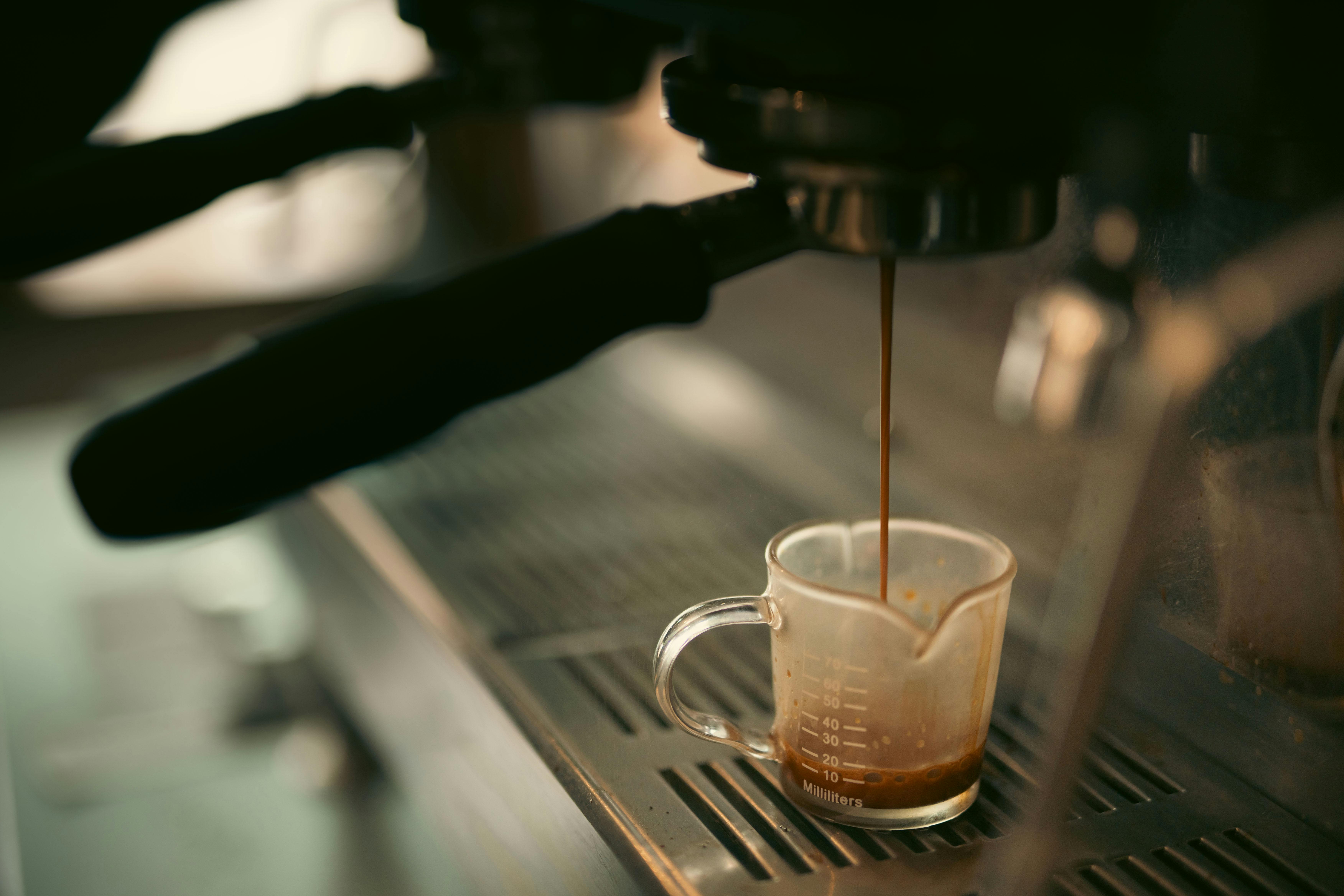 Close-up of Espresso Brewing in Measuring Cup · Free Stock Photo