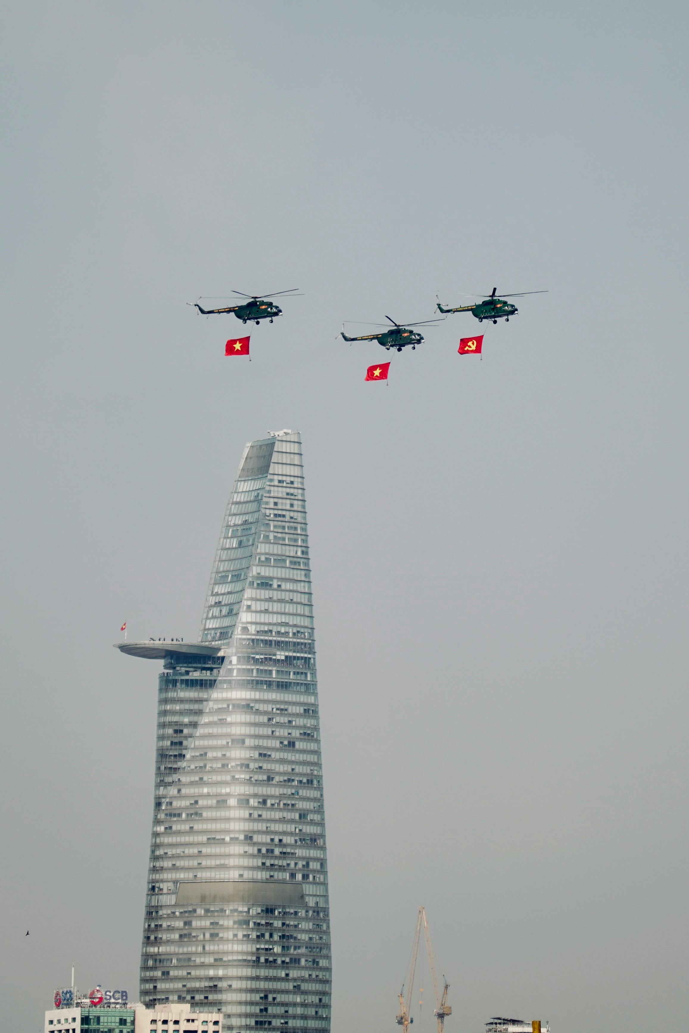 Helicopters Flying Over Bitexco Tower in Ho Chi Minh City · Free Stock ...