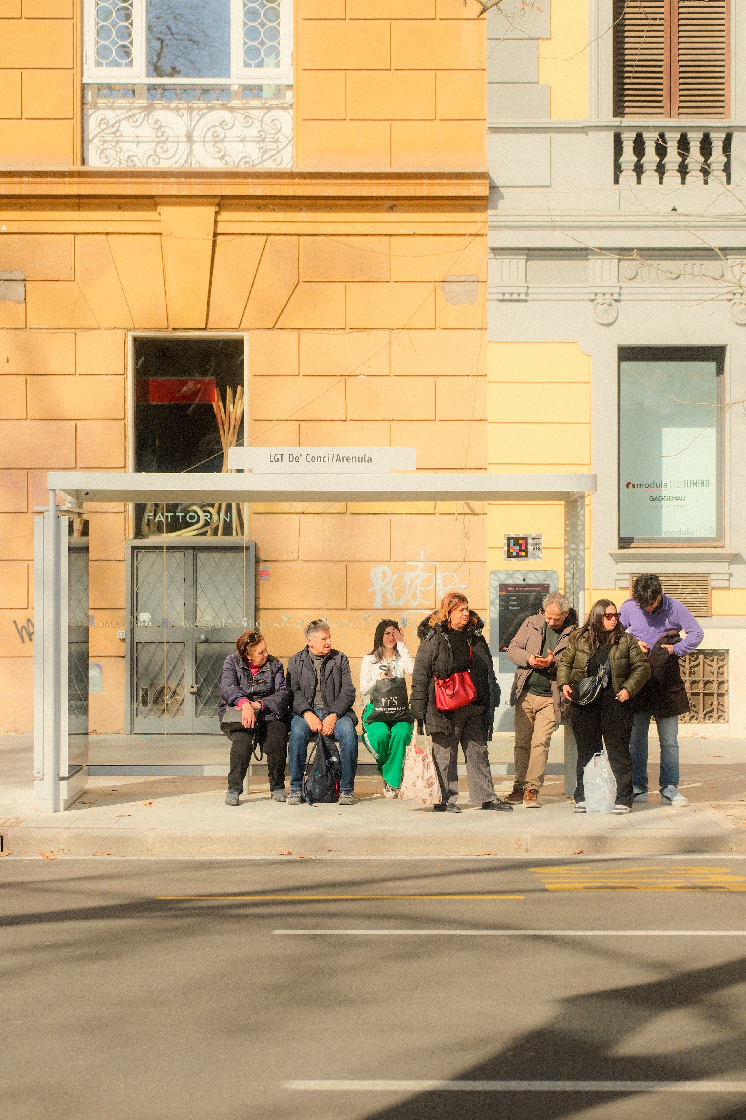 People Waiting at Urban Bus Stop · Free Stock Photo