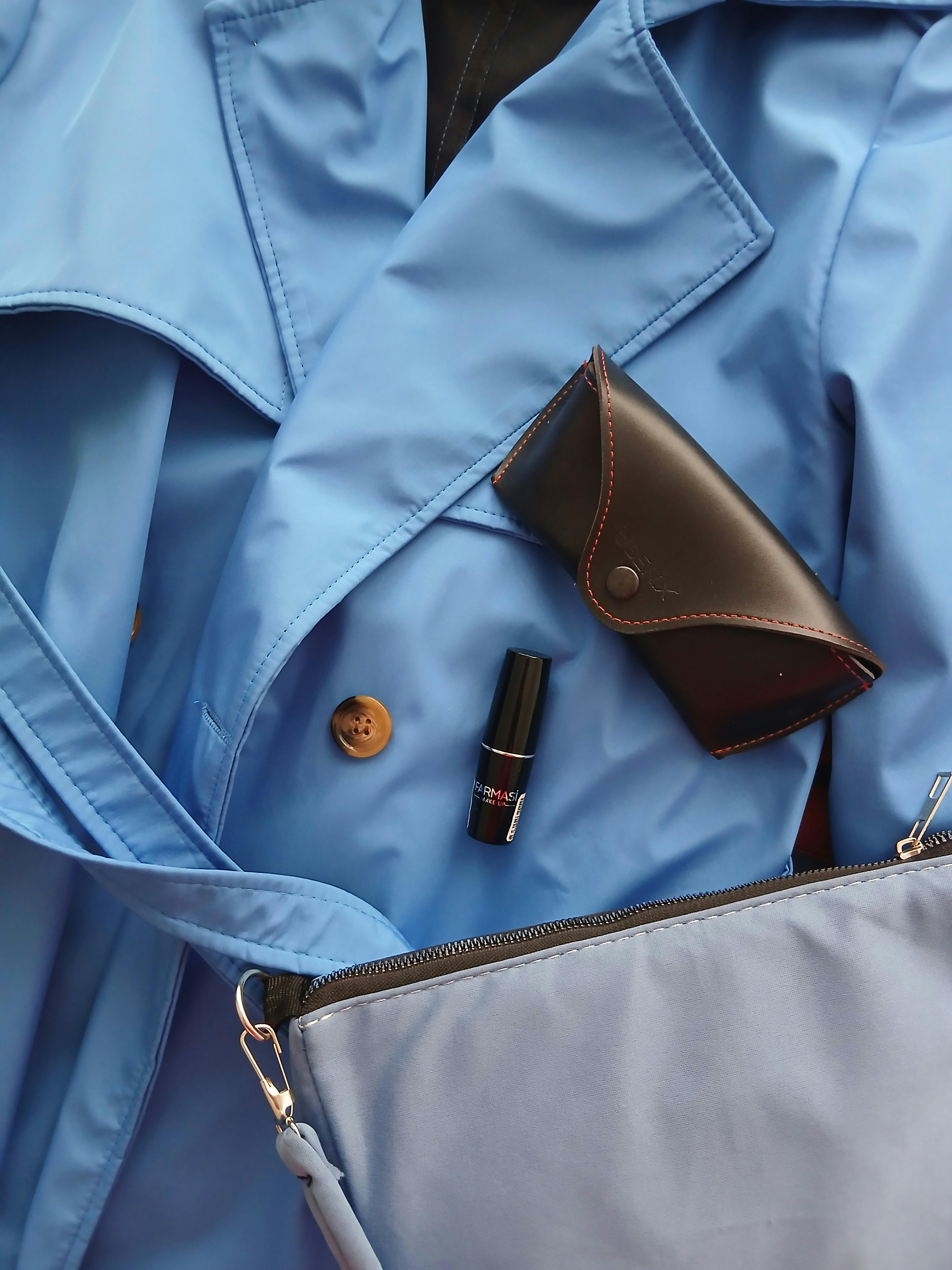 Stylish Blue Overcoat with Accessories Flat Lay · Free Stock Photo