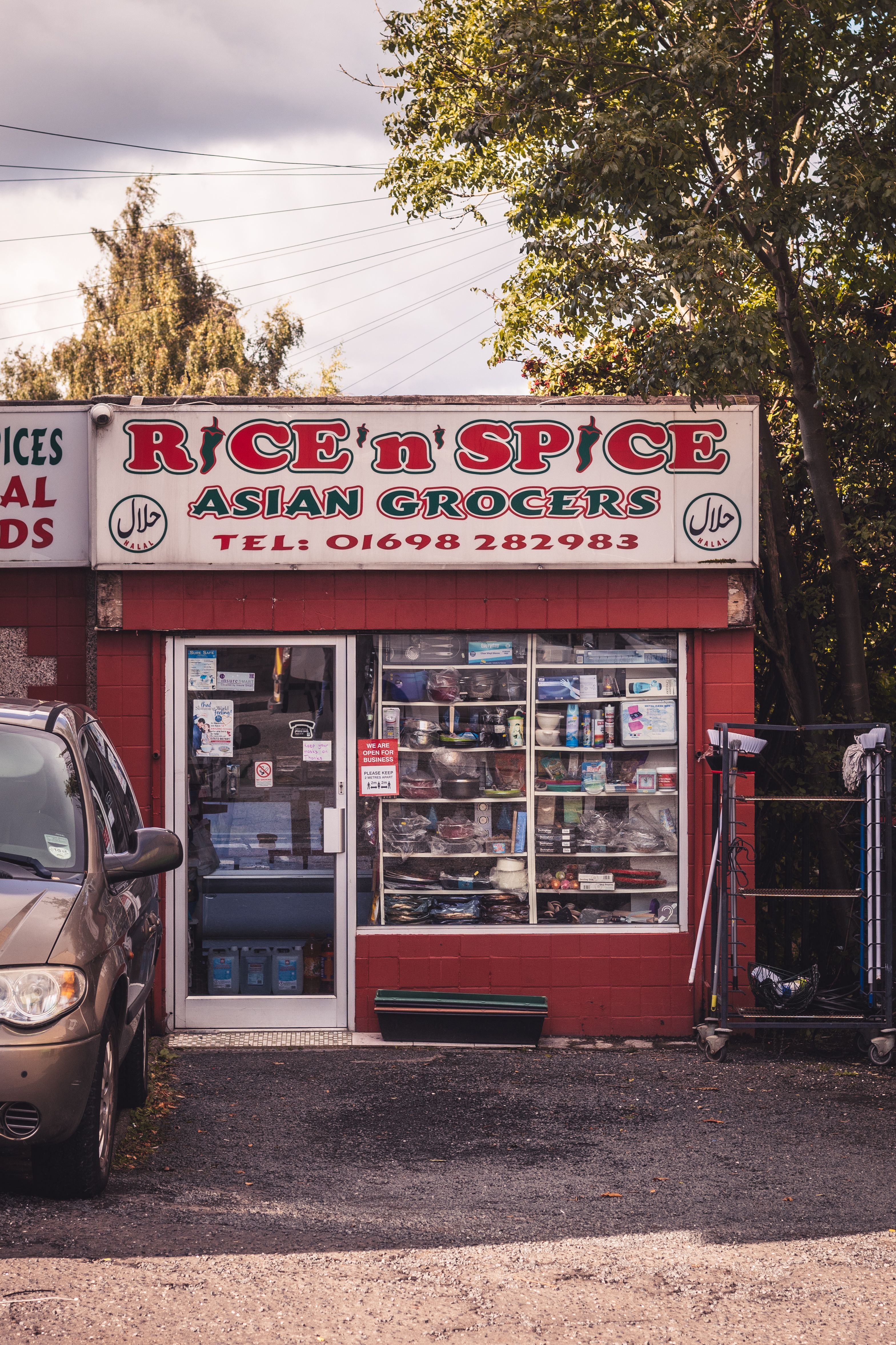 Charming Asian Grocery Storefront with Signage · Free Stock Photo