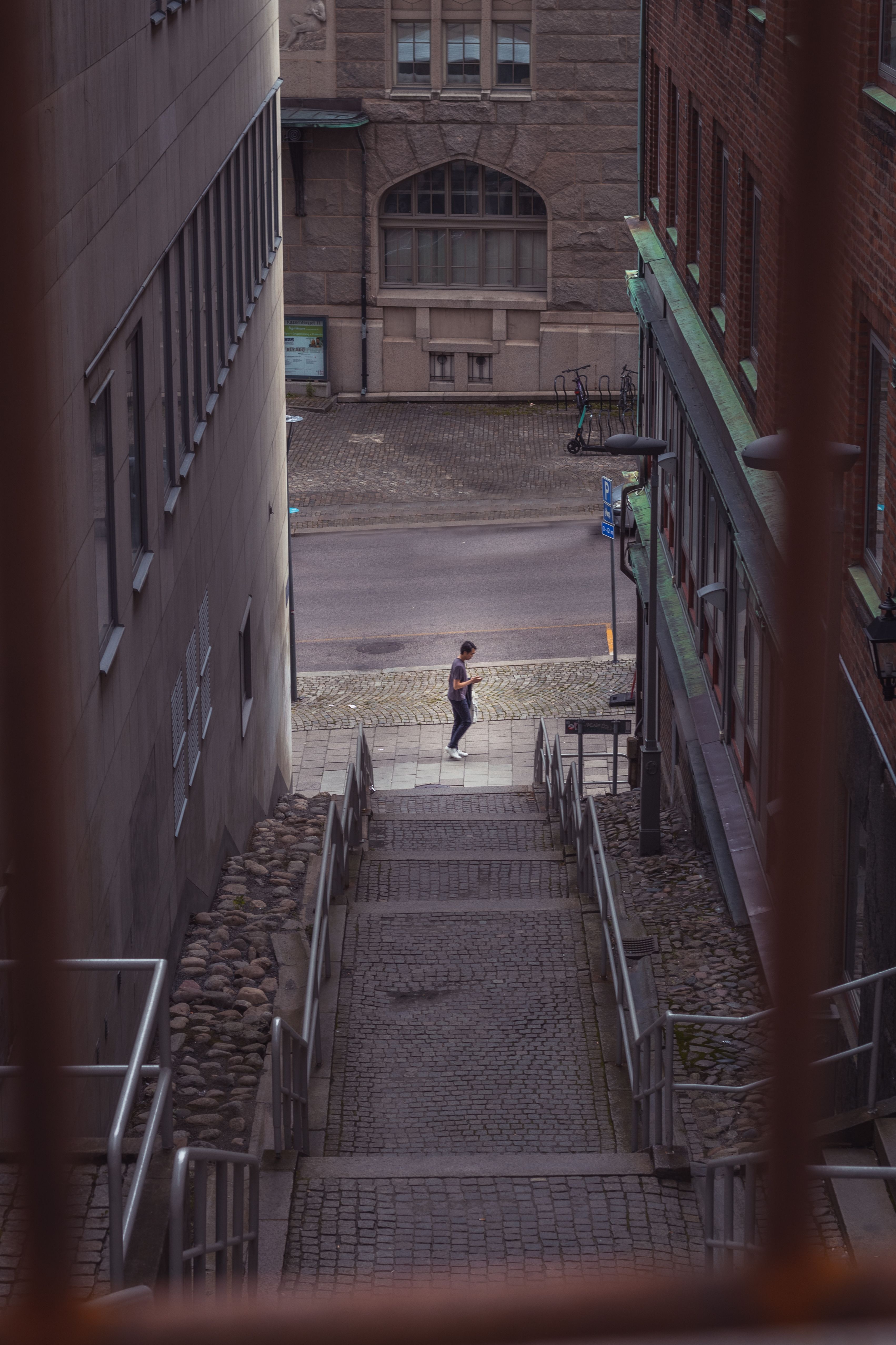 Urban Stairway Scene with Pedestrian · Free Stock Photo