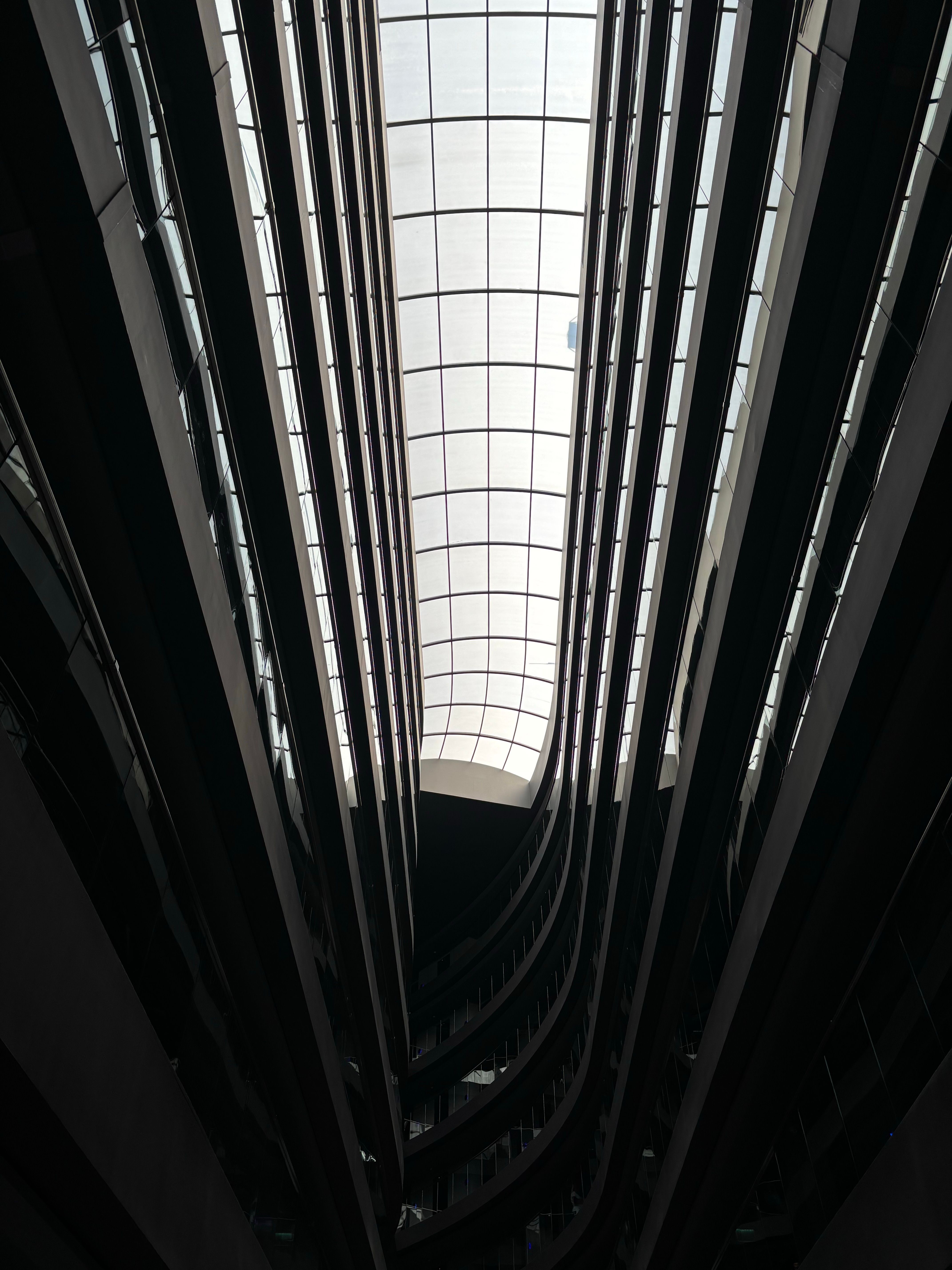 Modern Atrium with Curved Architecture Windows · Free Stock Photo