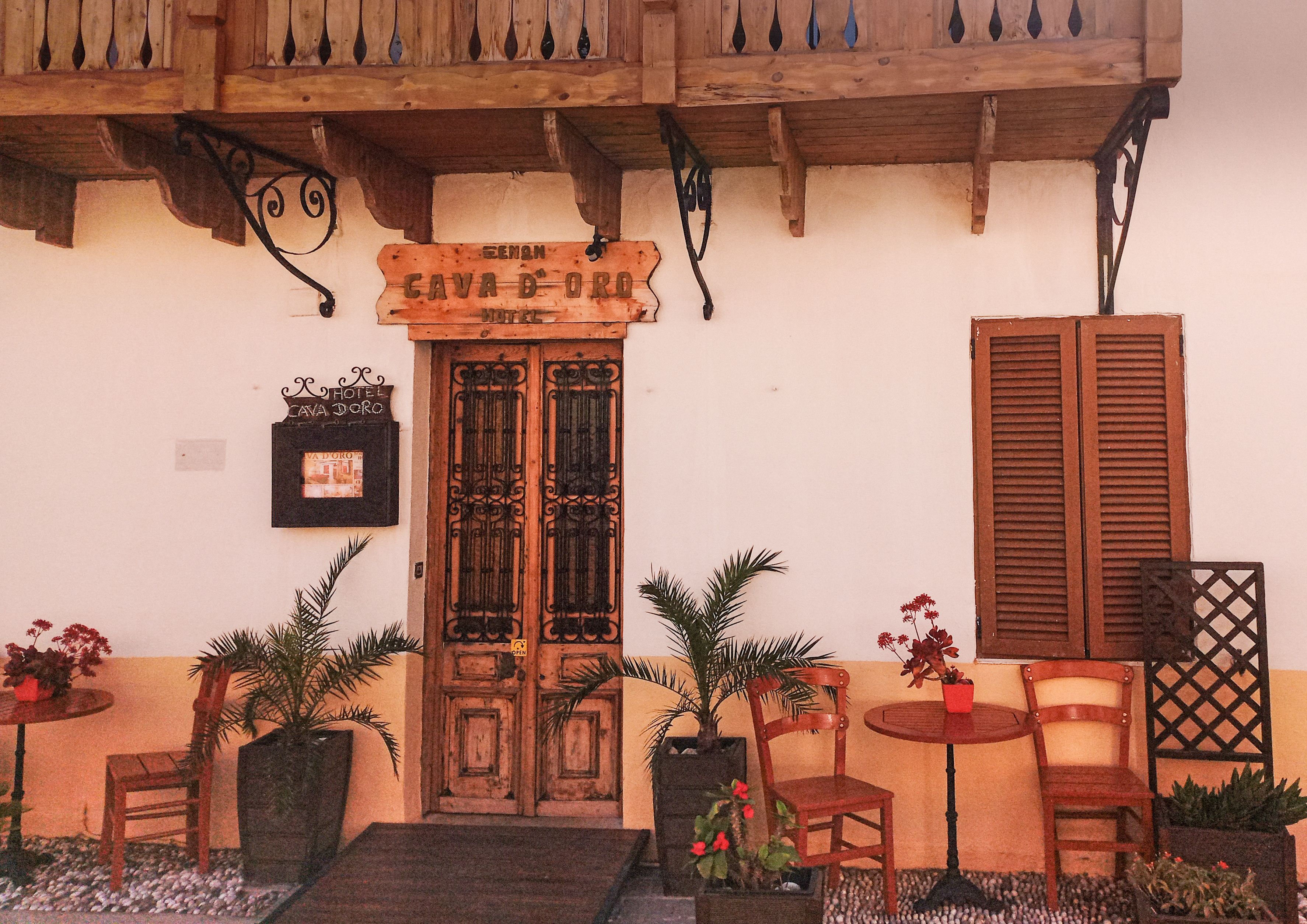 Charming Rustic Café Entrance with Wooden Details · Free Stock Photo